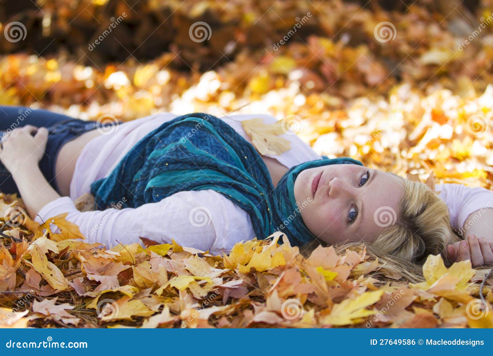 Cute Girl Lying in the Fall Leaves Stock Photo - Image of forest ...