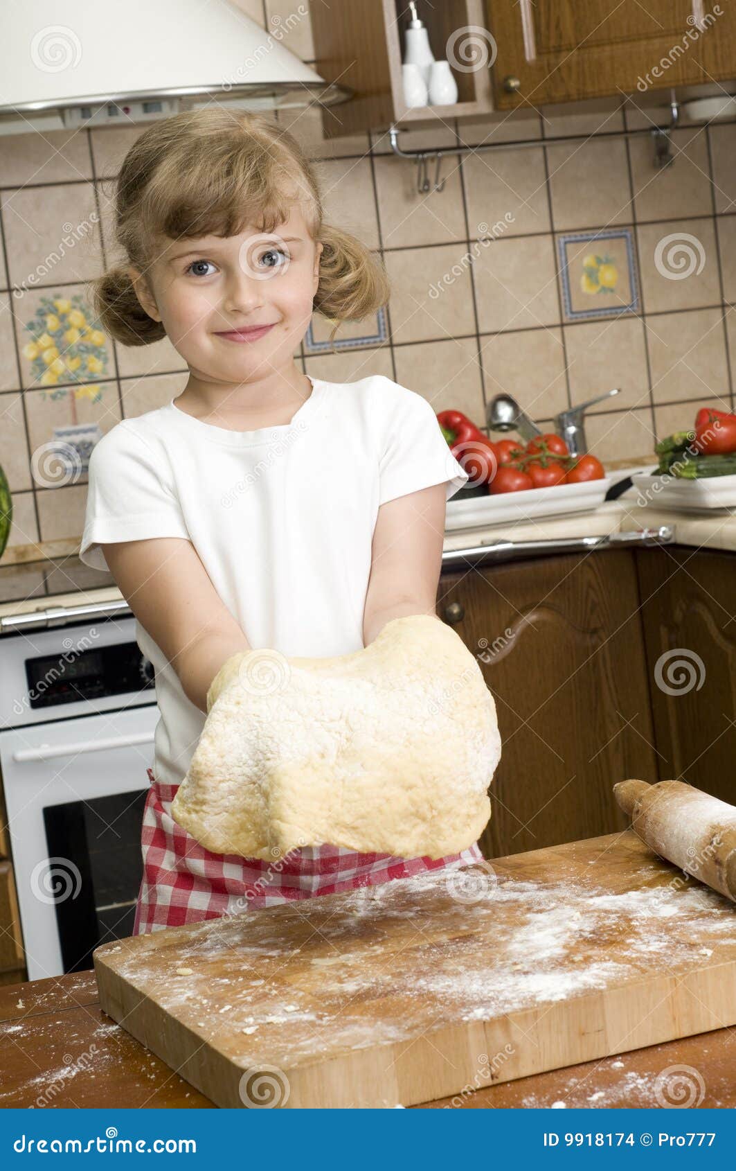 Cute girl making pastry stock photo. Image of domestic - 9918174