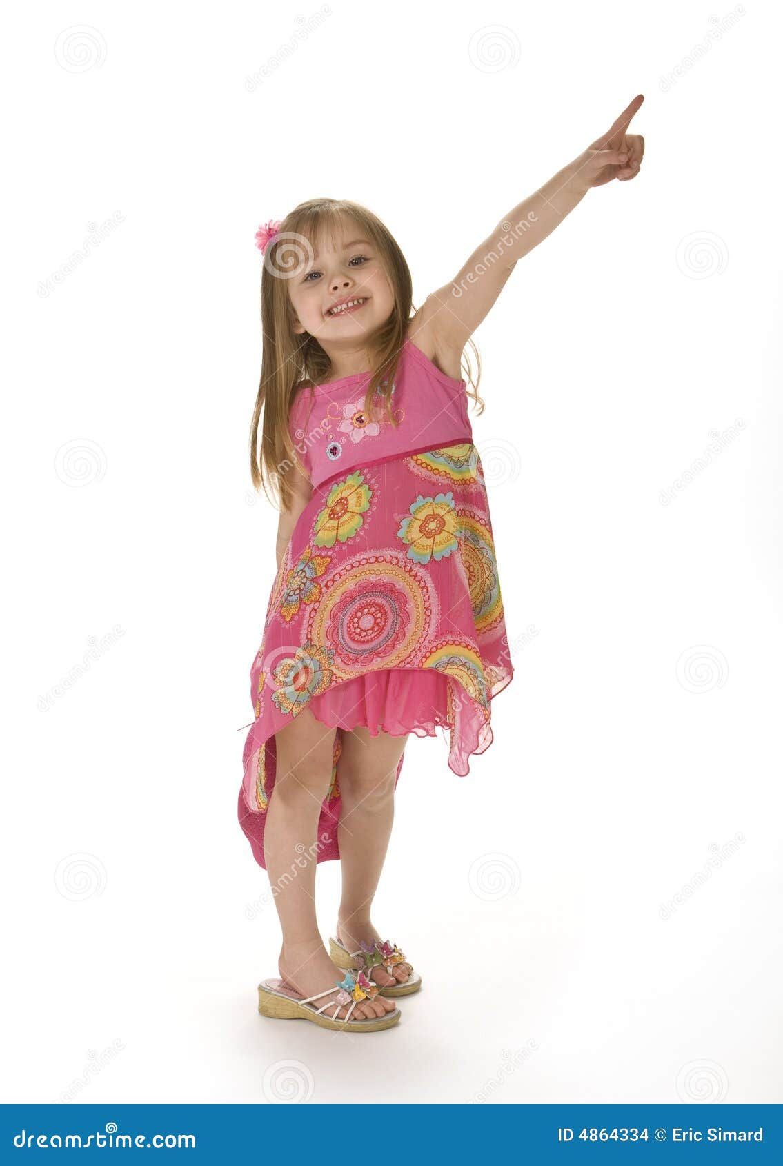 Cute Girl in Pink Pointing stock photo. Image of smiling - 4864334
