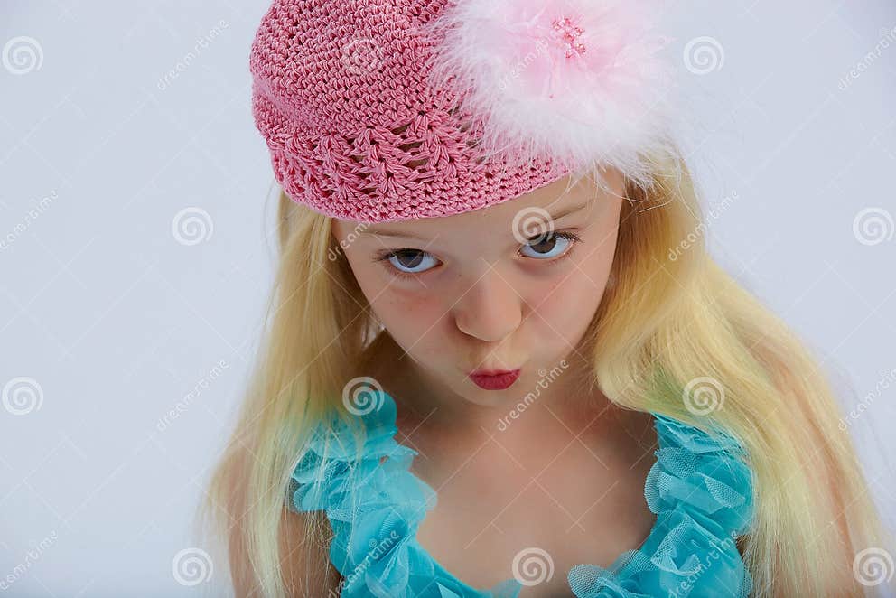 Cute girl pouting stock photo. Image of face, feather - 21561000