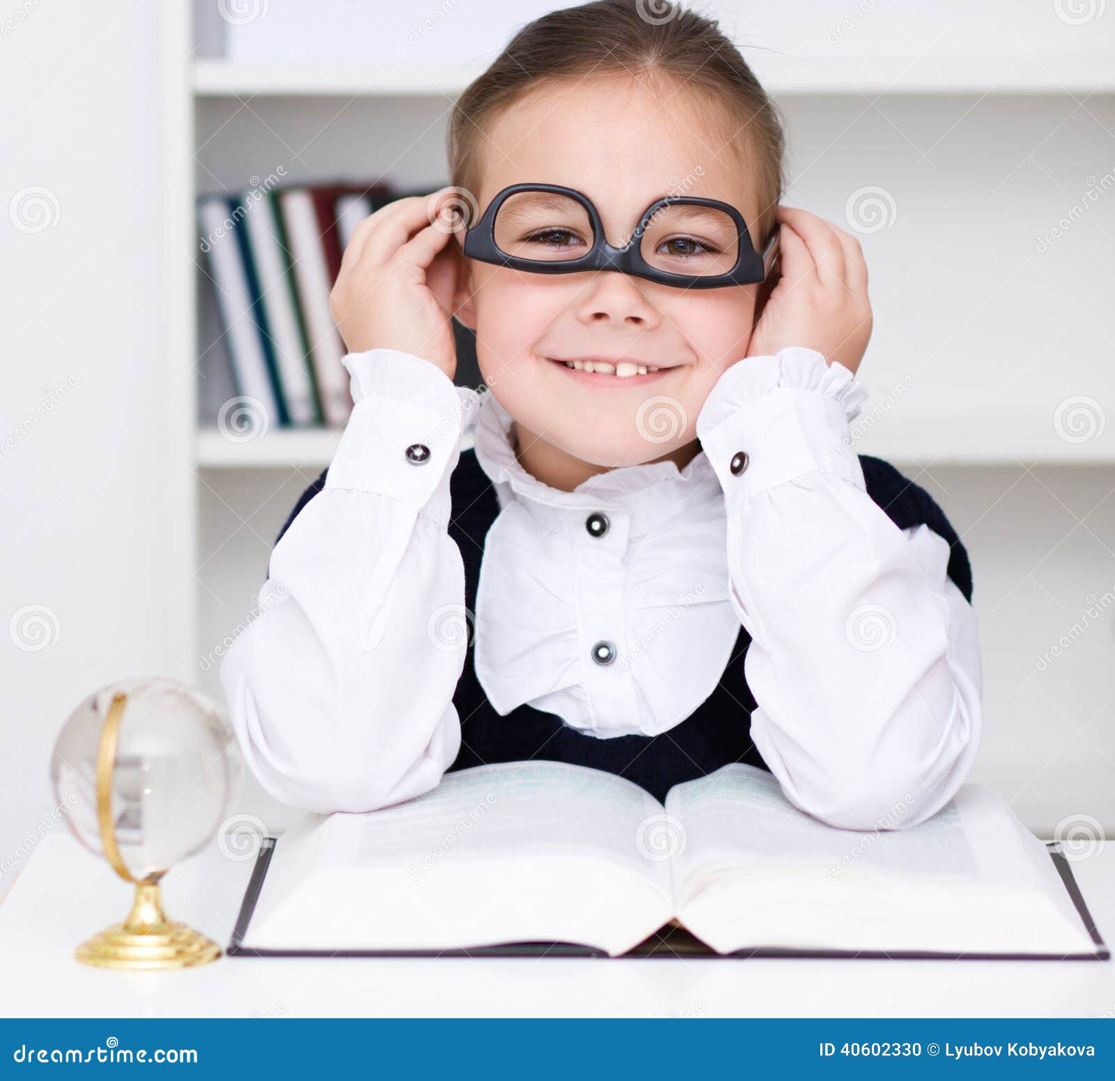 Cute girl is reading book stock photo. Image of apple - 40602330