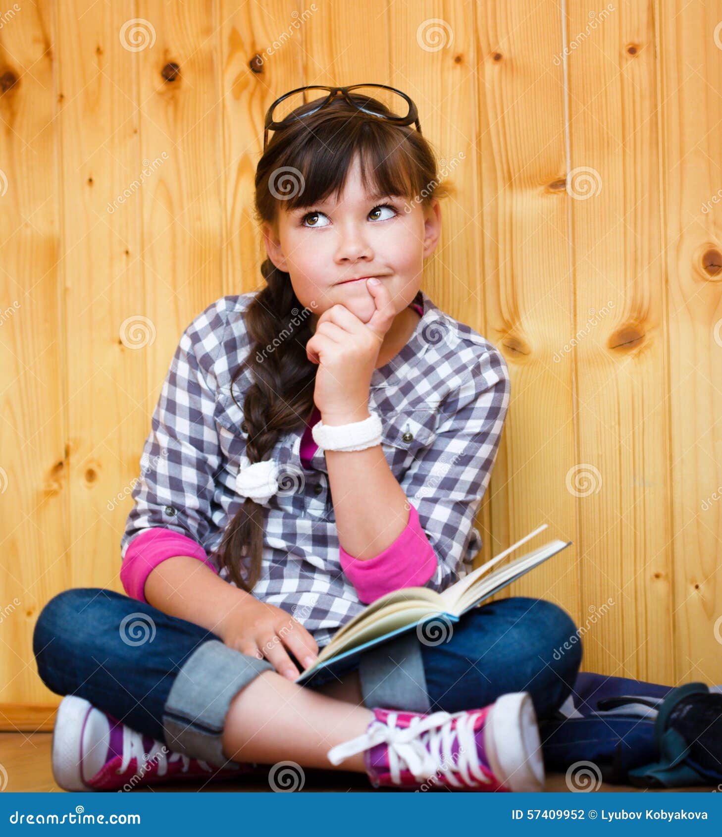 Cute girl is reading book stock photo. Image of close - 57409952