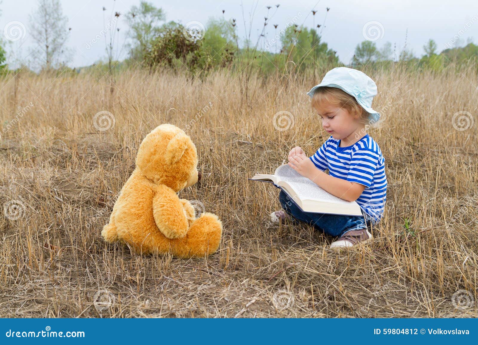 Cute Girl Reading Book Teddy Bear Stock Photo - Image of friendship ...