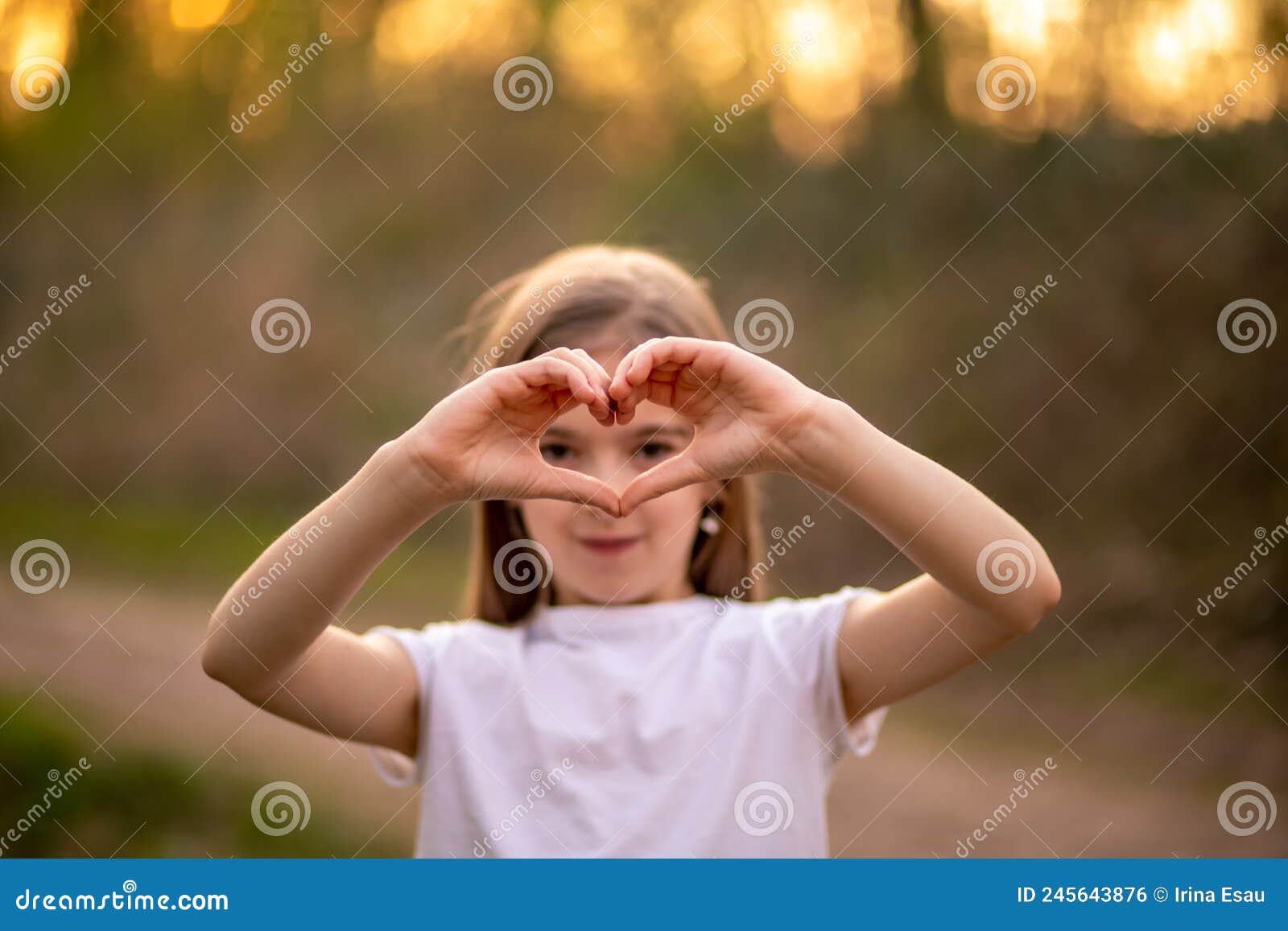 Cute Girl Showing a Heart with Her Hands Stock Photo - Image of female ...