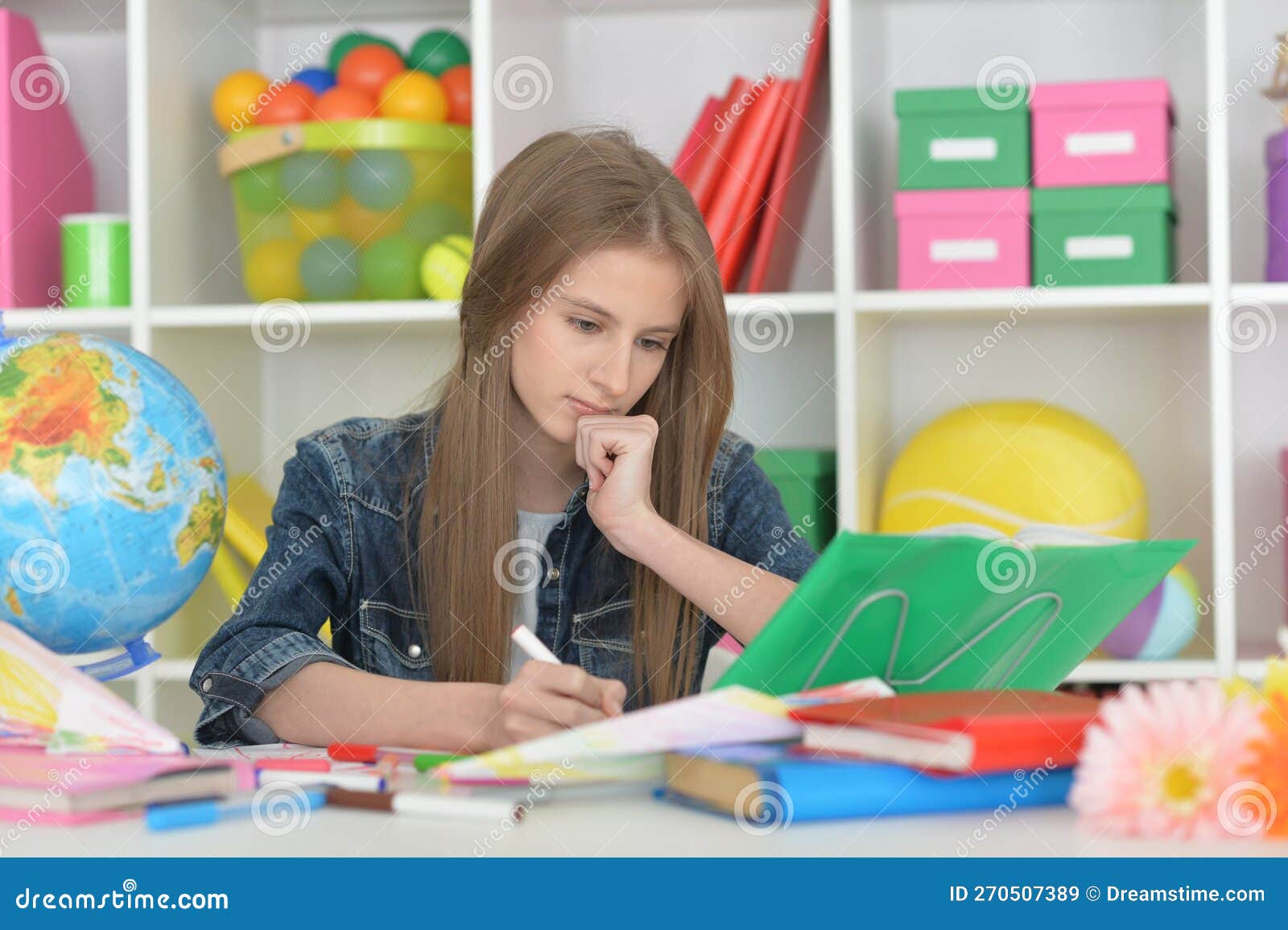 Girl Siting at Table with Globe and Studying Stock Image - Image of ...