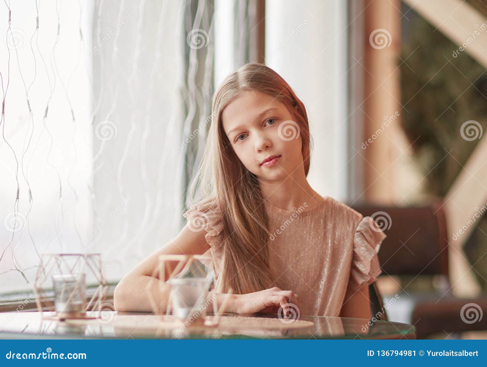 Cute Girl Sitting at a Table in a Cafe Stock Image - Image of enjoyment ...