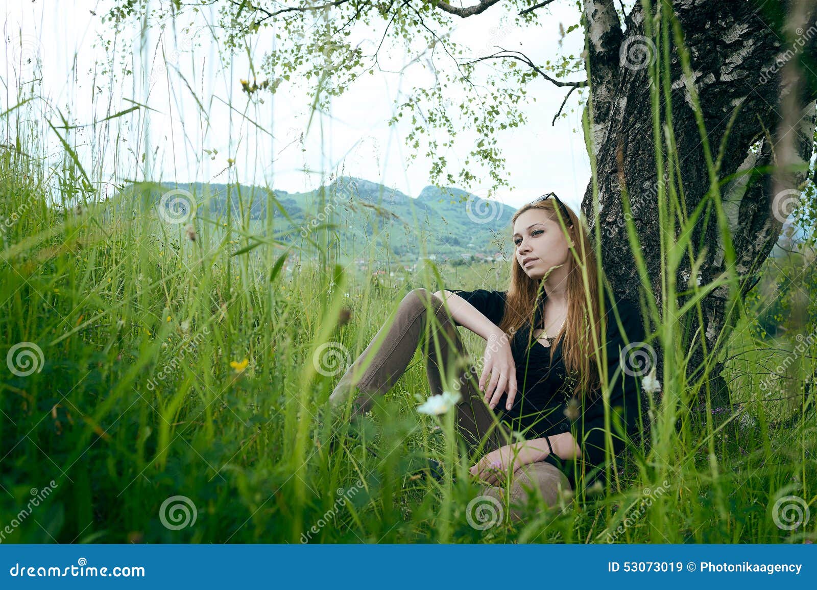 Cute Girl Sitting Under Tree Stock Image - Image of tree, adorable ...
