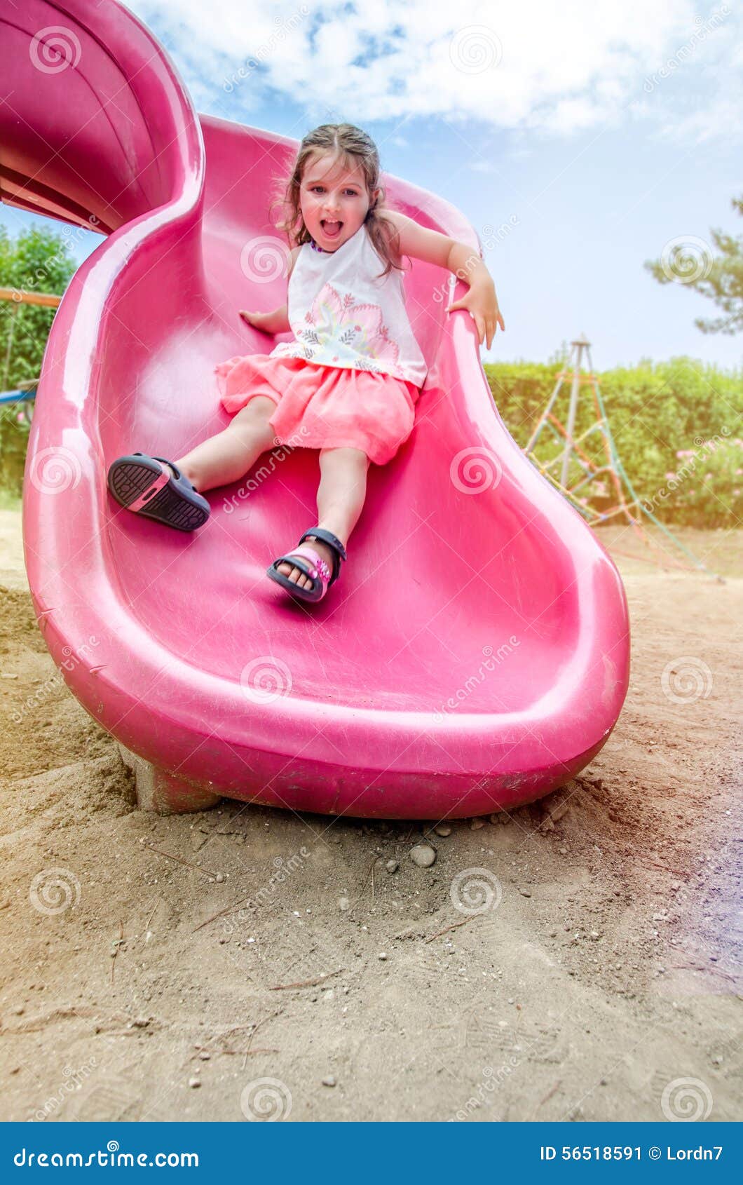Cute Girl Sliding Down stock image. Image of expression - 56518591