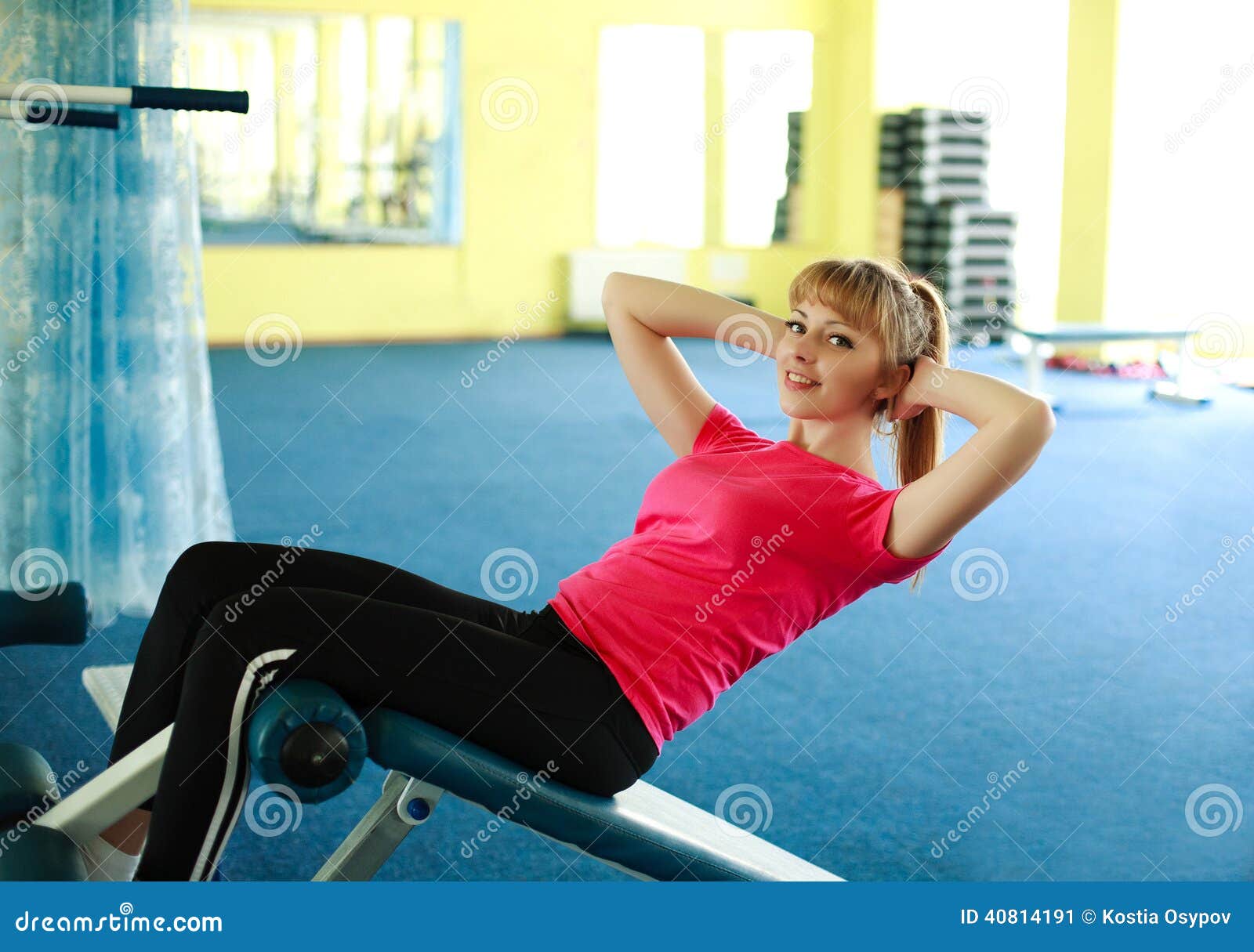 Cute Girl with a Smile, Doing Press Exercise on the Bench Stock Image ...