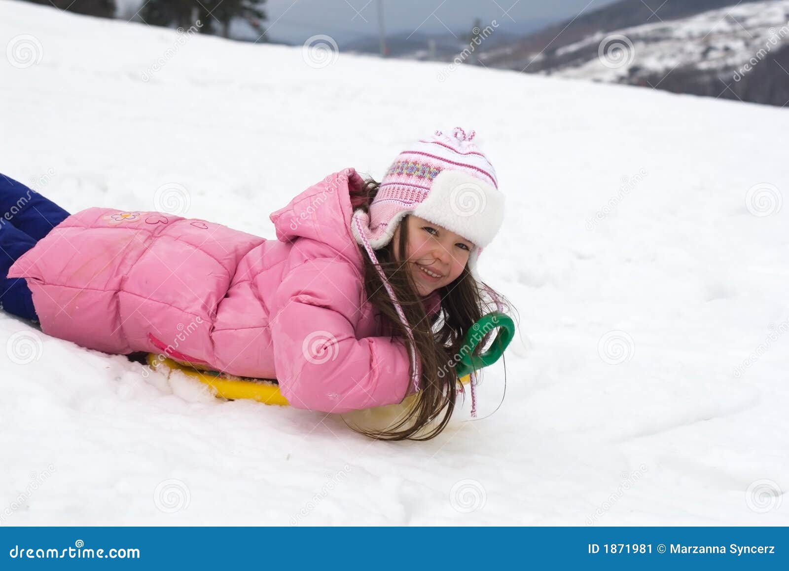 Cute Girl on a Snow Sled stock image. Image of happily - 1871981