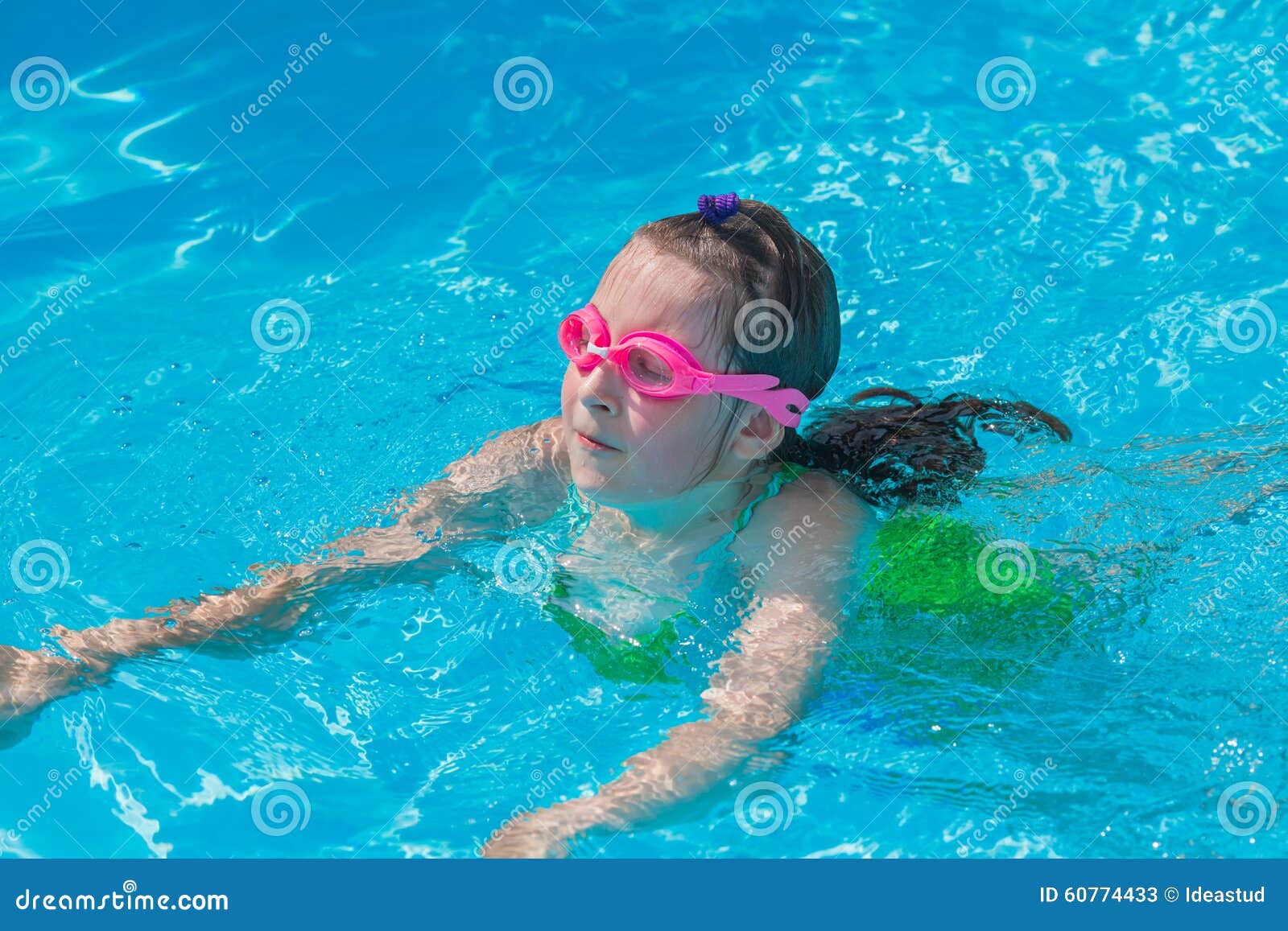 Cute girl swim in the pool stock image. Image of girl - 60774433