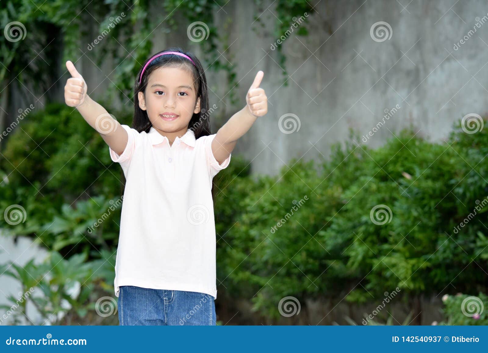 Cute Girl with Thumbs Up stock image. Image of adorable - 142540937