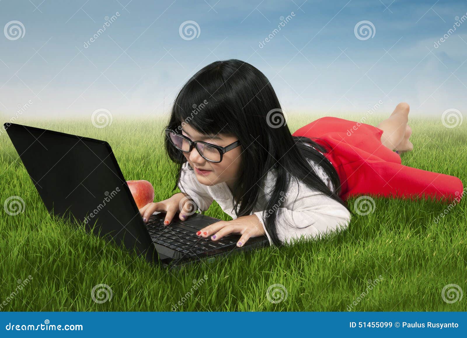 Cute Girl Typing on Laptop at Field Stock Image - Image of indian ...