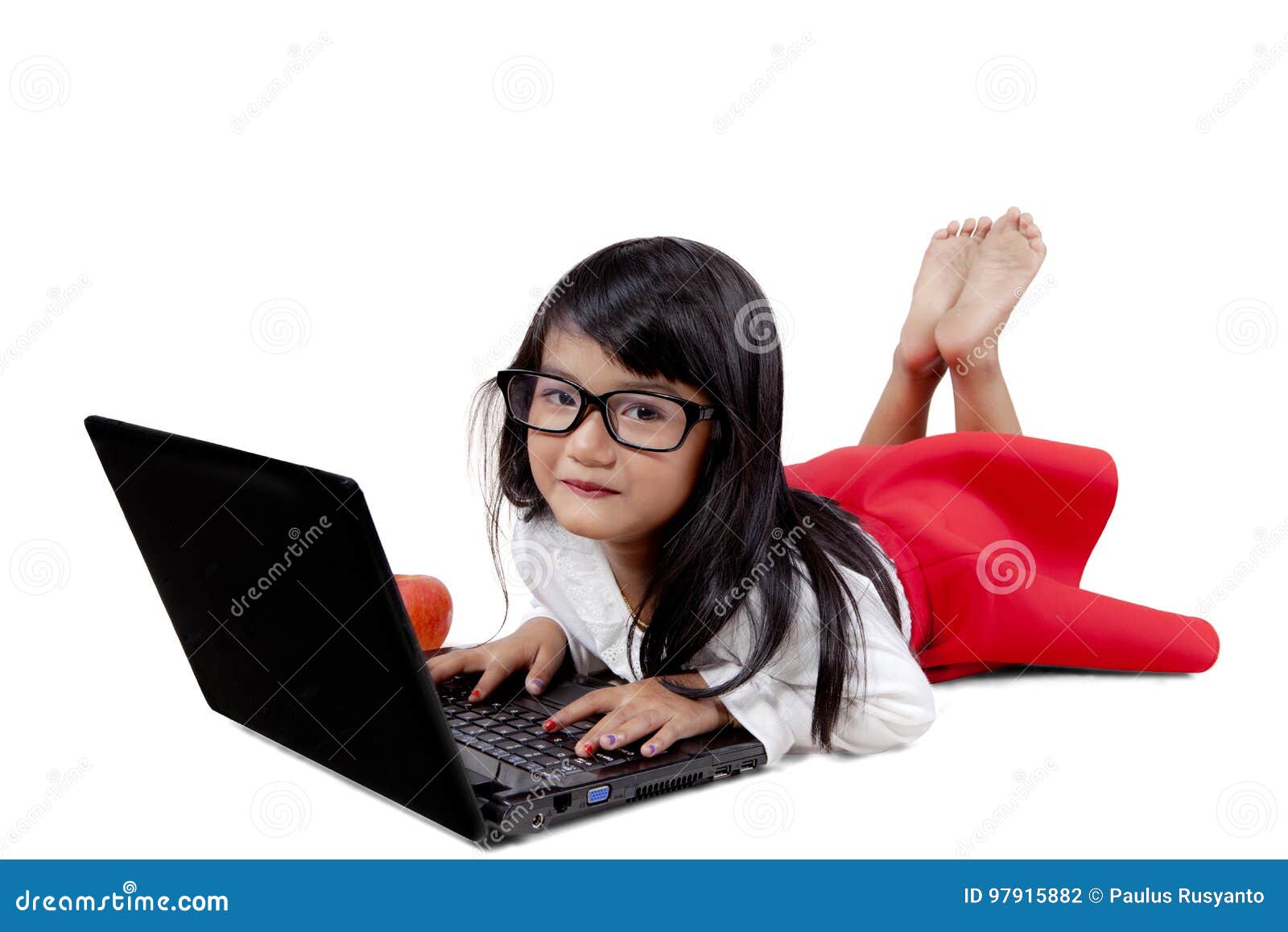 Cute Girl Using a Laptop Computer on Studio Stock Photo - Image of ...