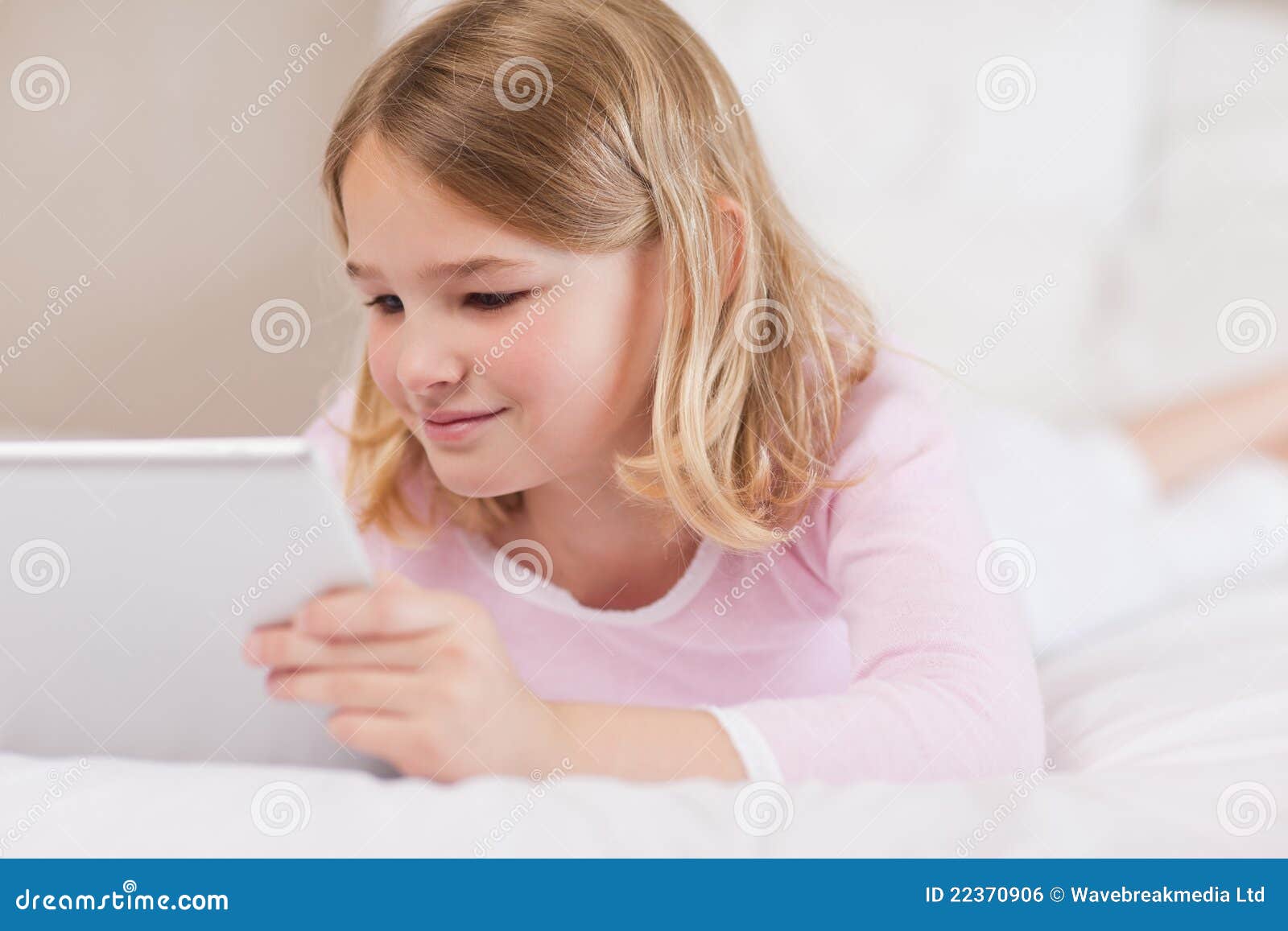 Cute Girl Using a Tablet Computer Stock Photo - Image of small ...