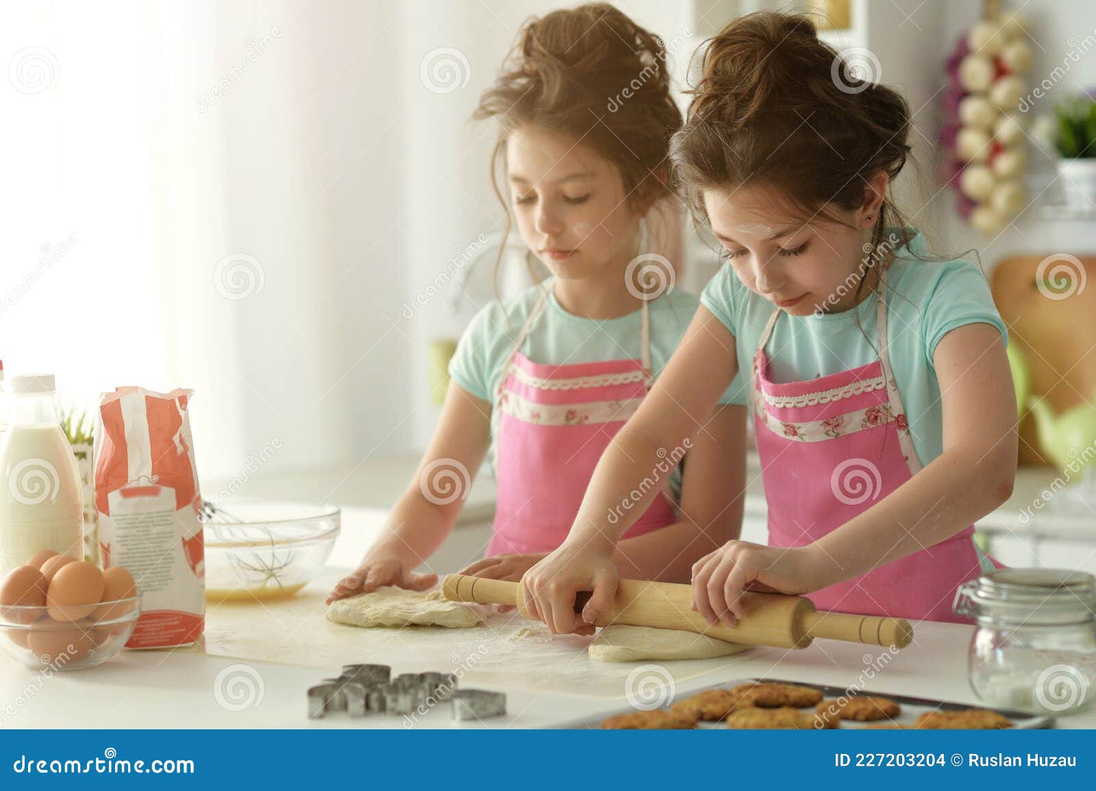 Cute Girls Baking in the Kitchen at Home Stock Photo - Image of ...