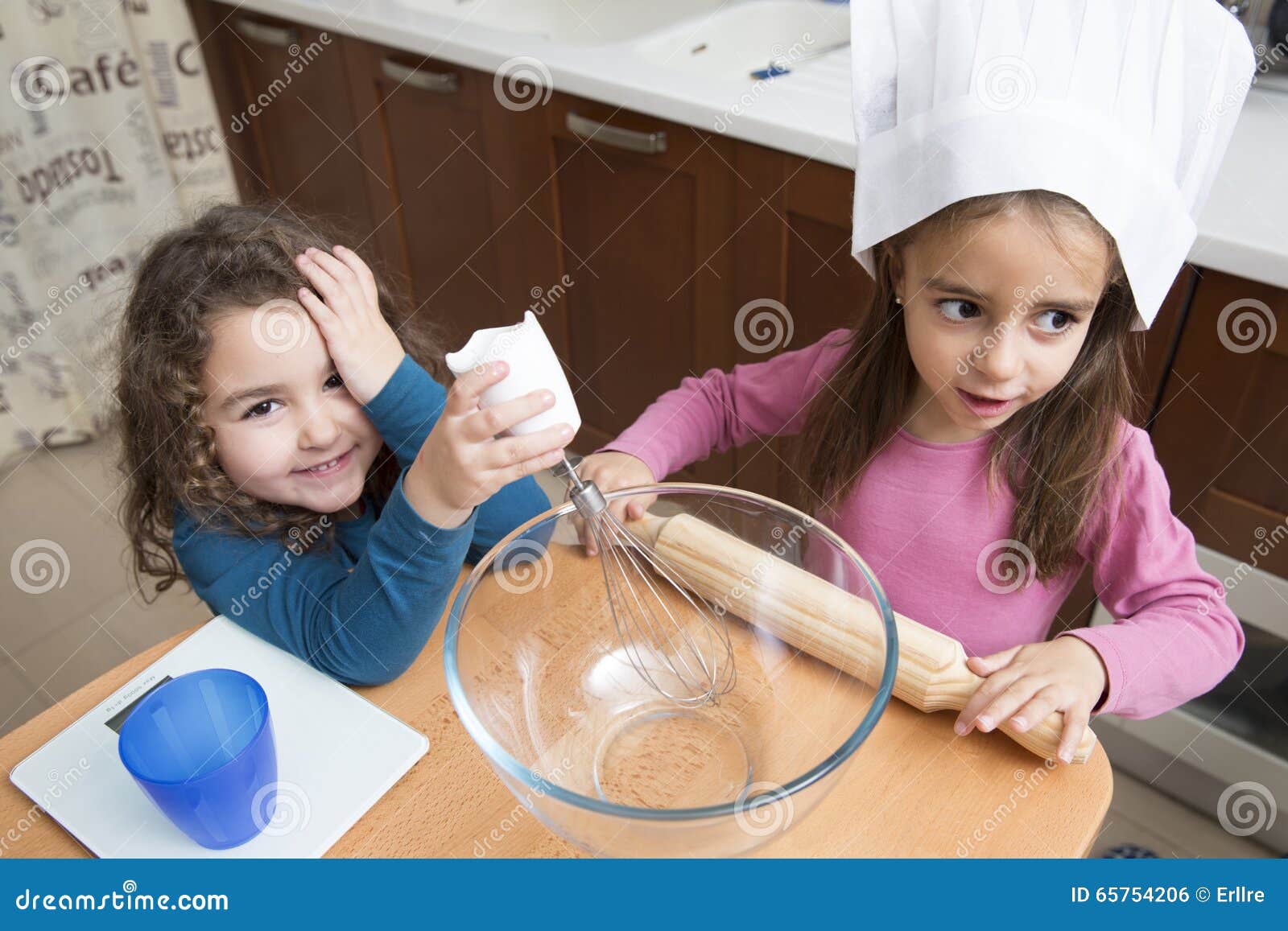 Cute Girls Cooking in the Kitchen Stock Photo - Image of smiling ...
