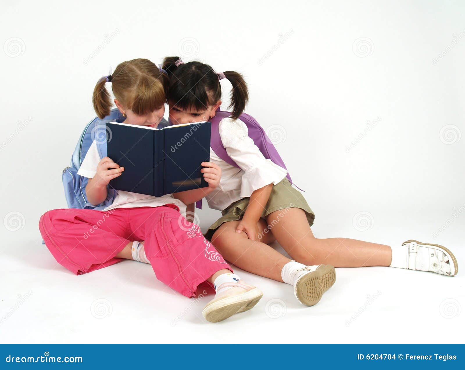 Cute girls with notebook stock photo. Image of smile, colleagues - 6204704