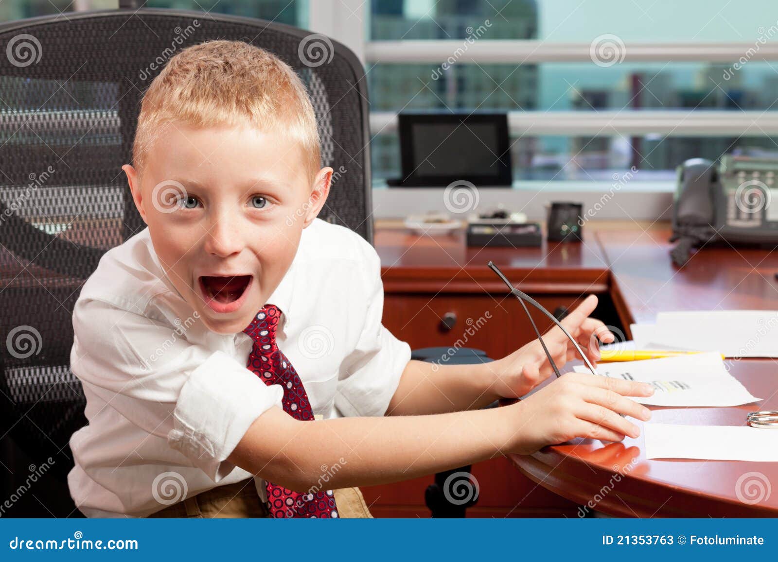 Cute goofy boy in office stock image. Image of smiling - 21353763