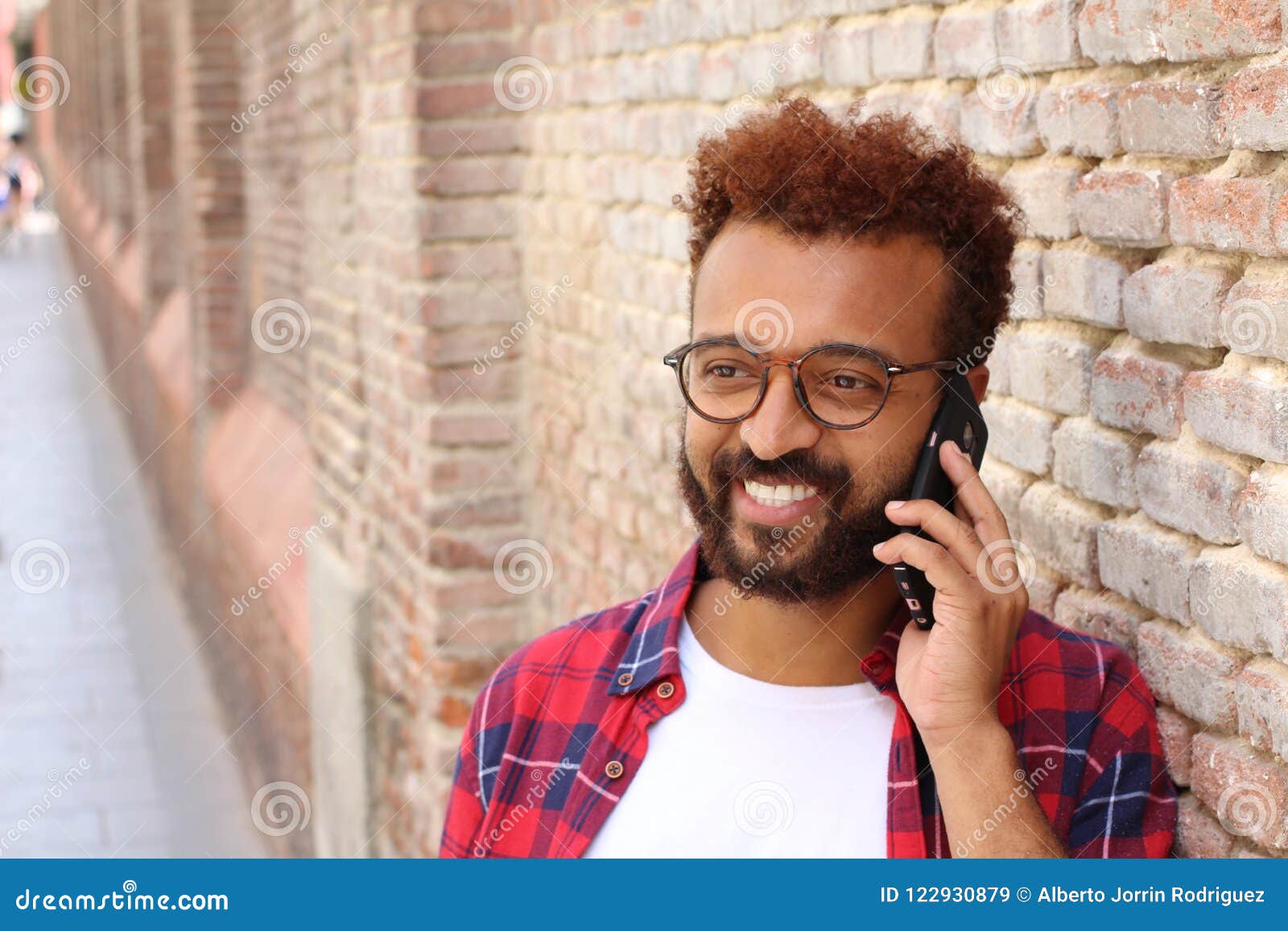 Cute guy calling by phone stock image. Image of african - 122930879