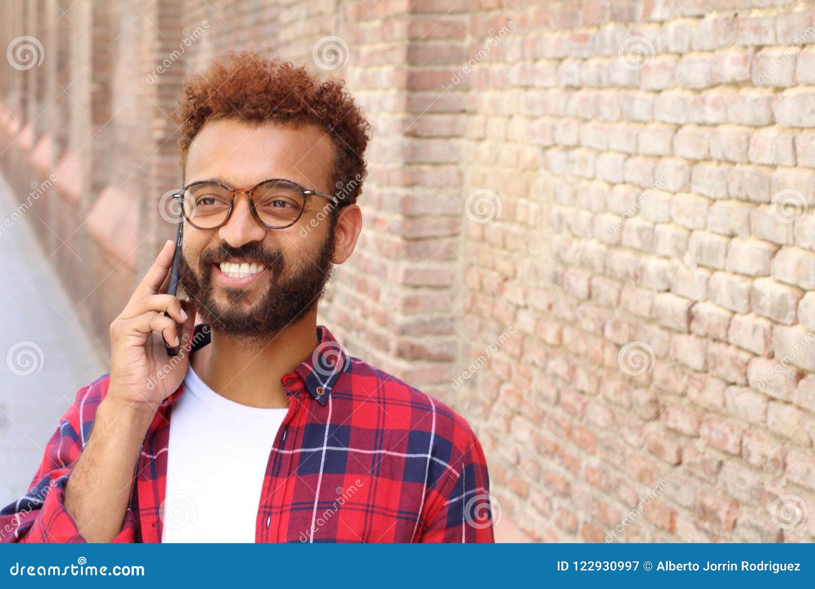 Cute guy calling by phone stock image. Image of communication - 122930997