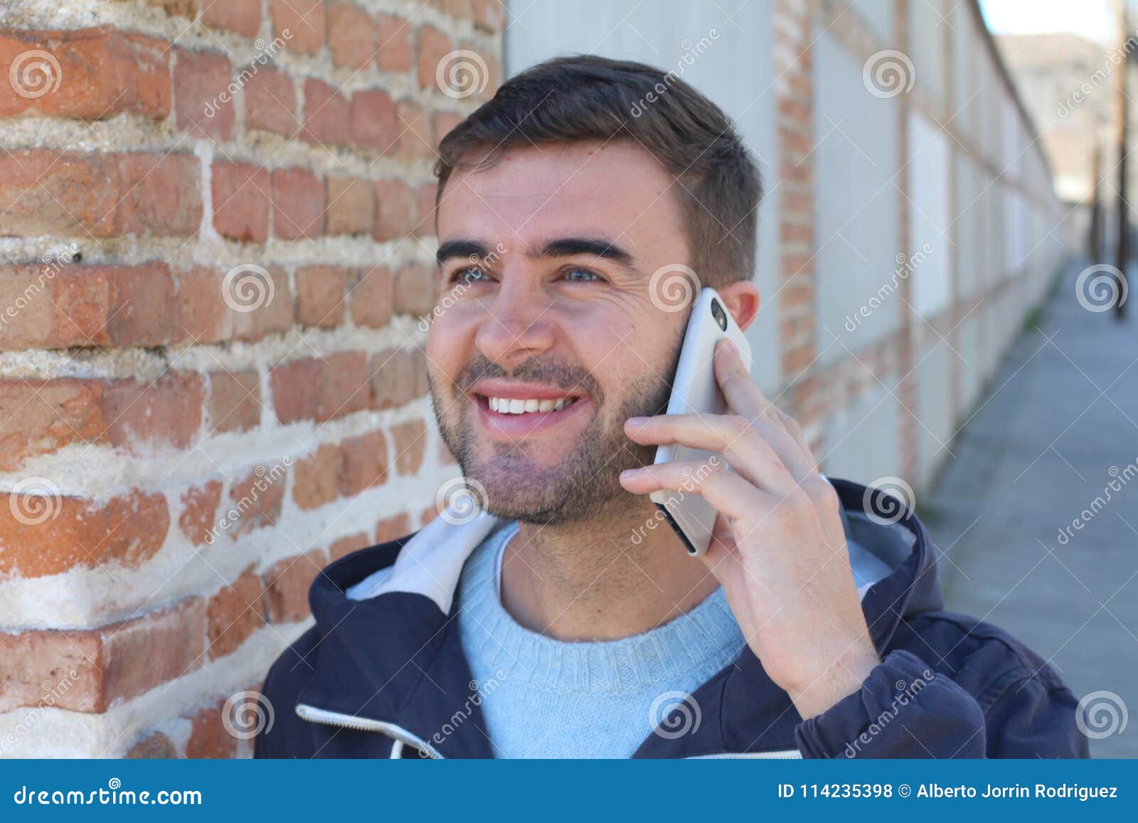 Cute Guy Calling on the Street Stock Photo - Image of handsome, cell ...