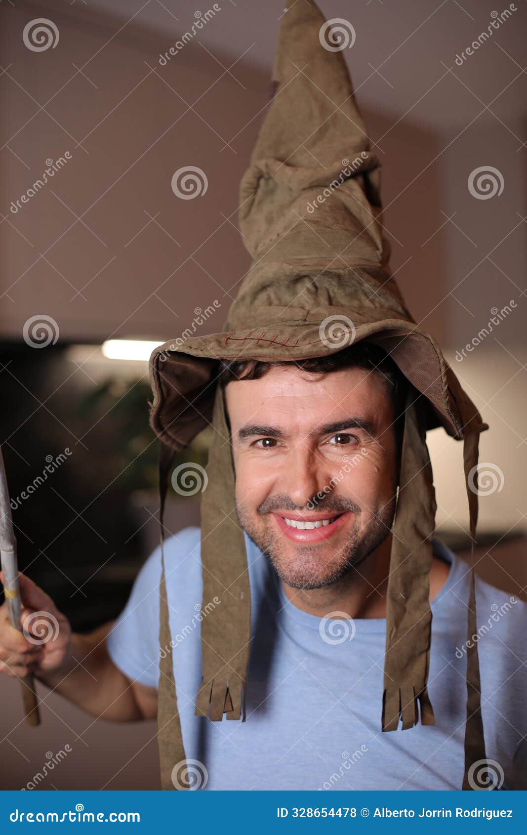 Cute guy doing some magic stock photo. Image of game - 328654478
