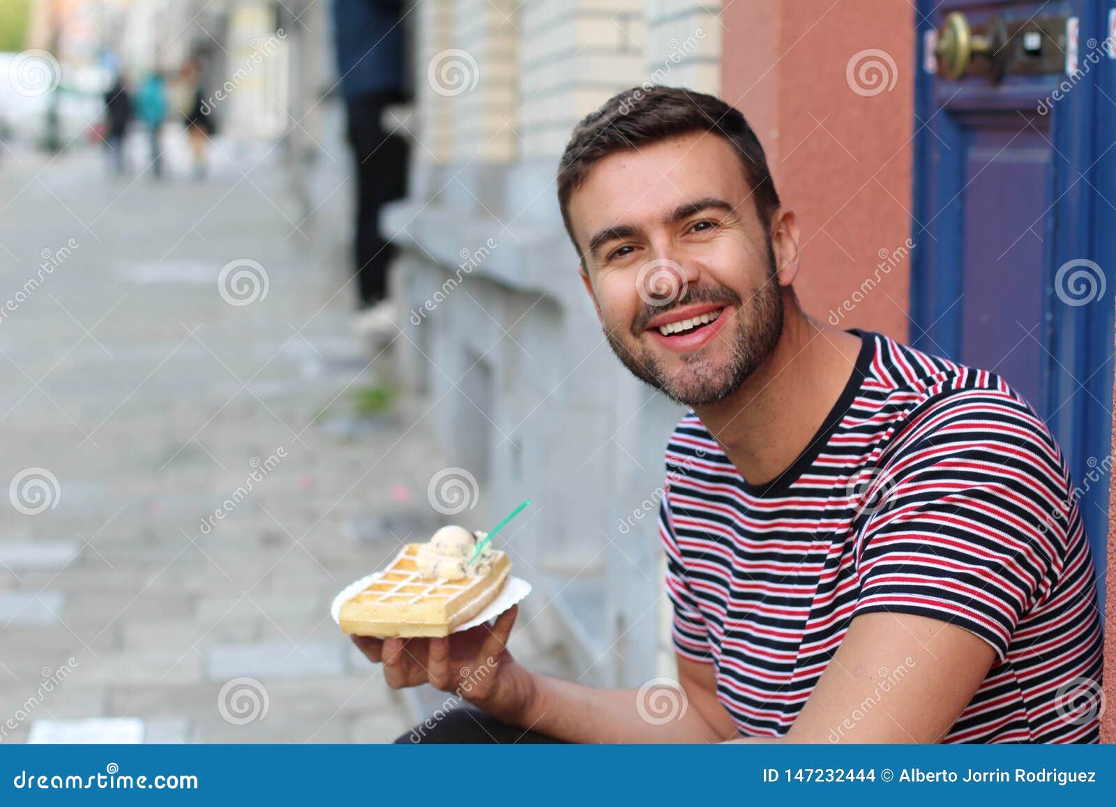 Cute Guy Eating a Waffle in Brussels, Belgium Stock Photo - Image of ...