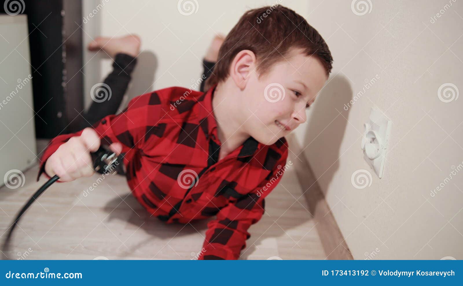 Cute Guy in Red Black Plaid Shirt Rubs Hands, Pulls Electric Plug Out ...
