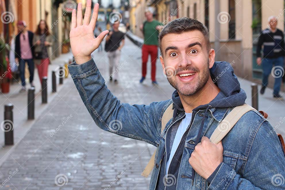 Cute Guy Saying Hi Outdoors Stock Photo - Image of looking, friend ...