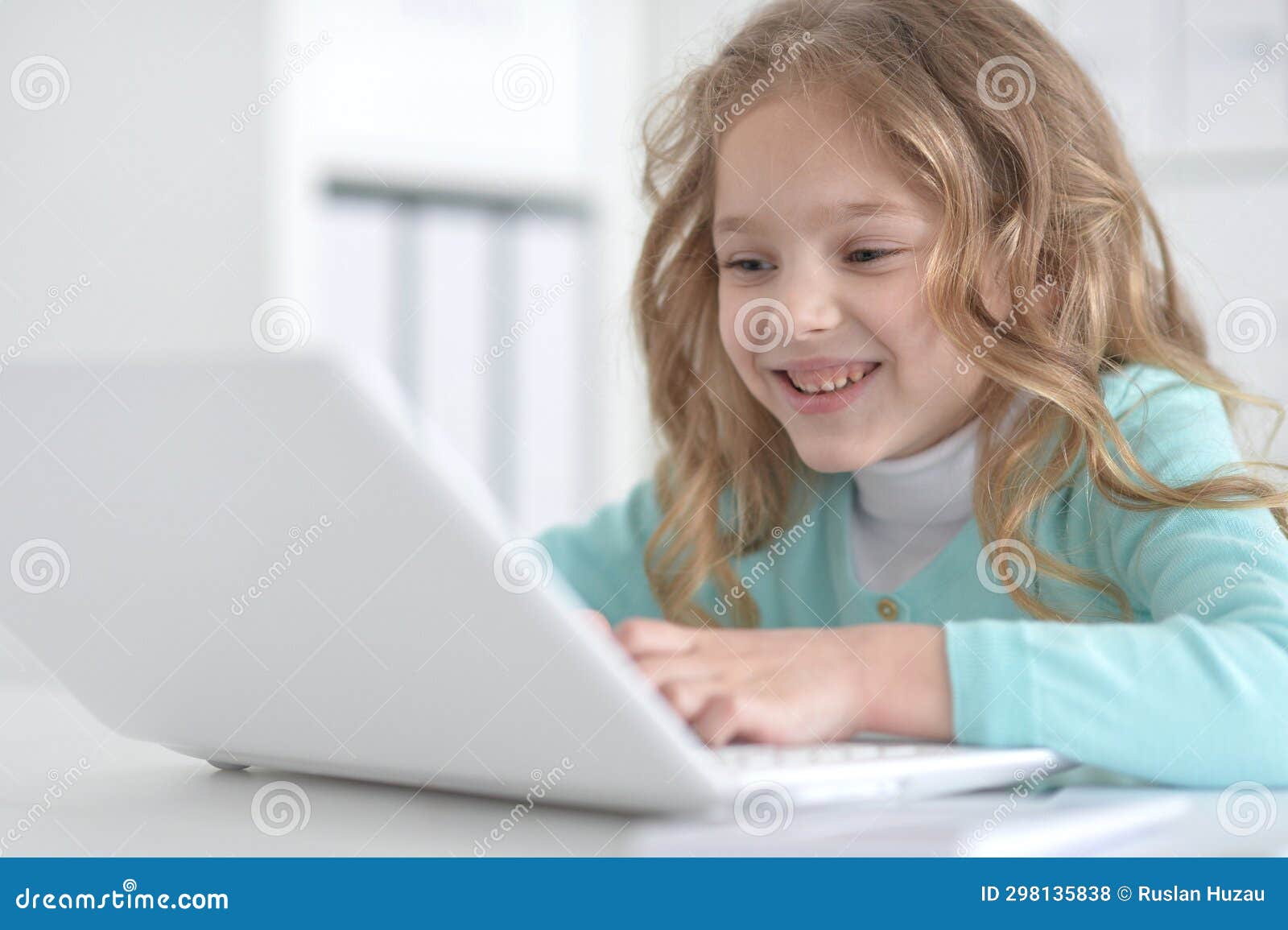 Cute and Happy Little Girl Children Using Laptop Computer Stock Photo ...