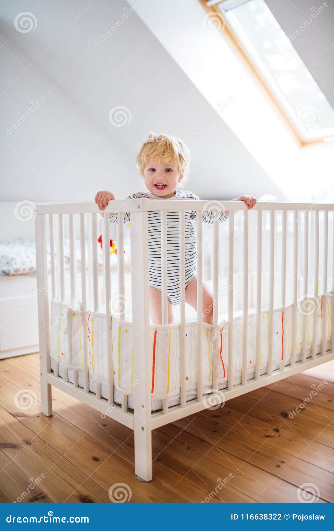 Cute Toddler Boy Standing in a Cot at Home. Stock Photo - Image of ...