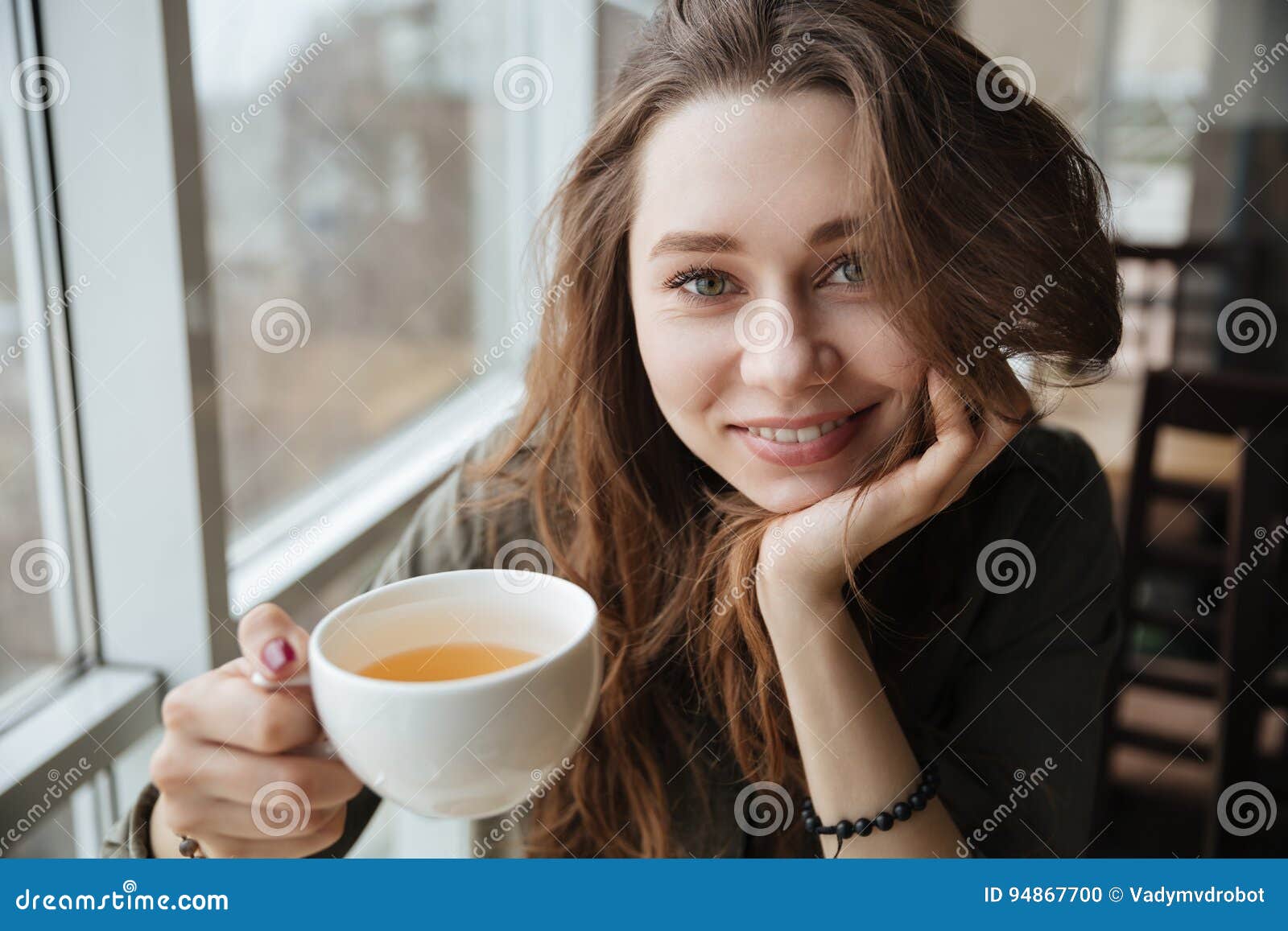 Cute Happy Young Beautiful Lady Sitting in Cafe Drinking Tea Stock ...
