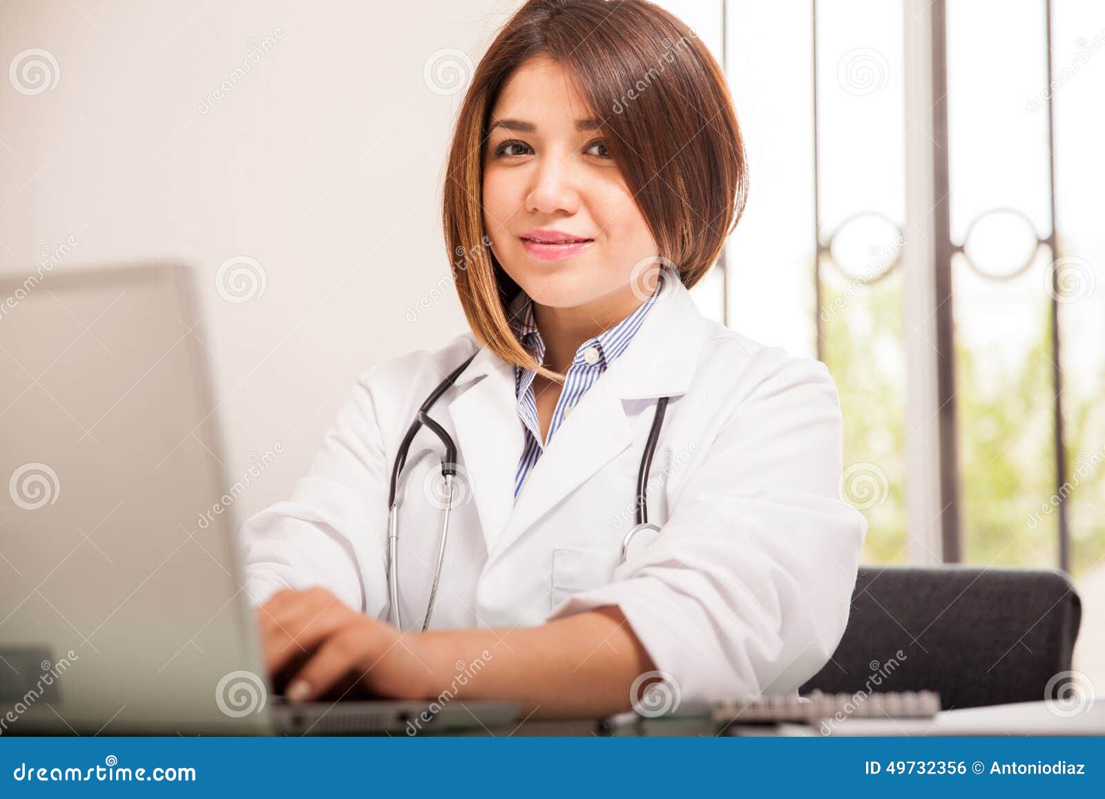 Cute Hispanic Doctor at Work Stock Photo - Image of mixed, practice ...