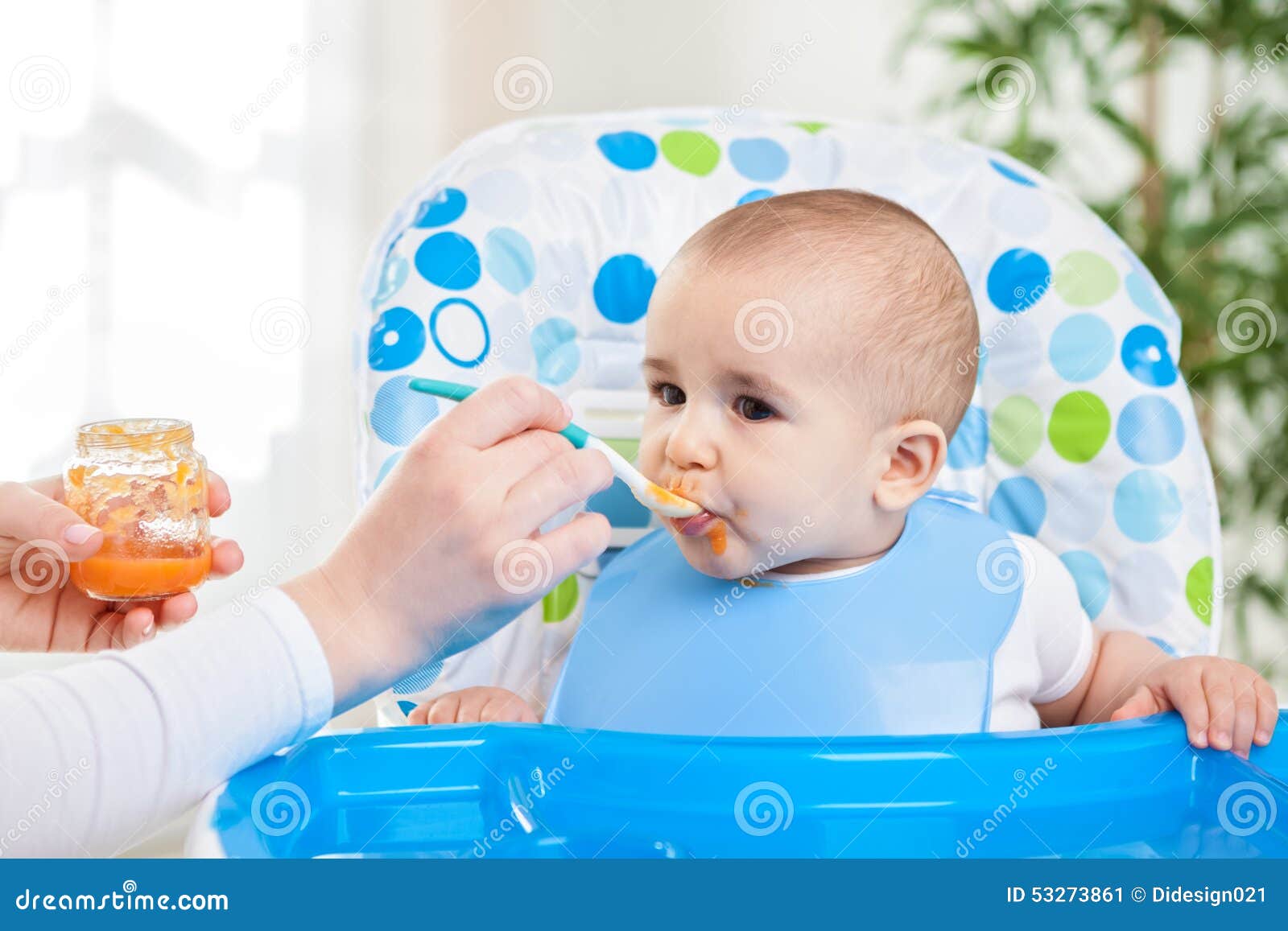 Cute Hungry Baby Eating Fruit Mash Stock Image - Image of child, food ...