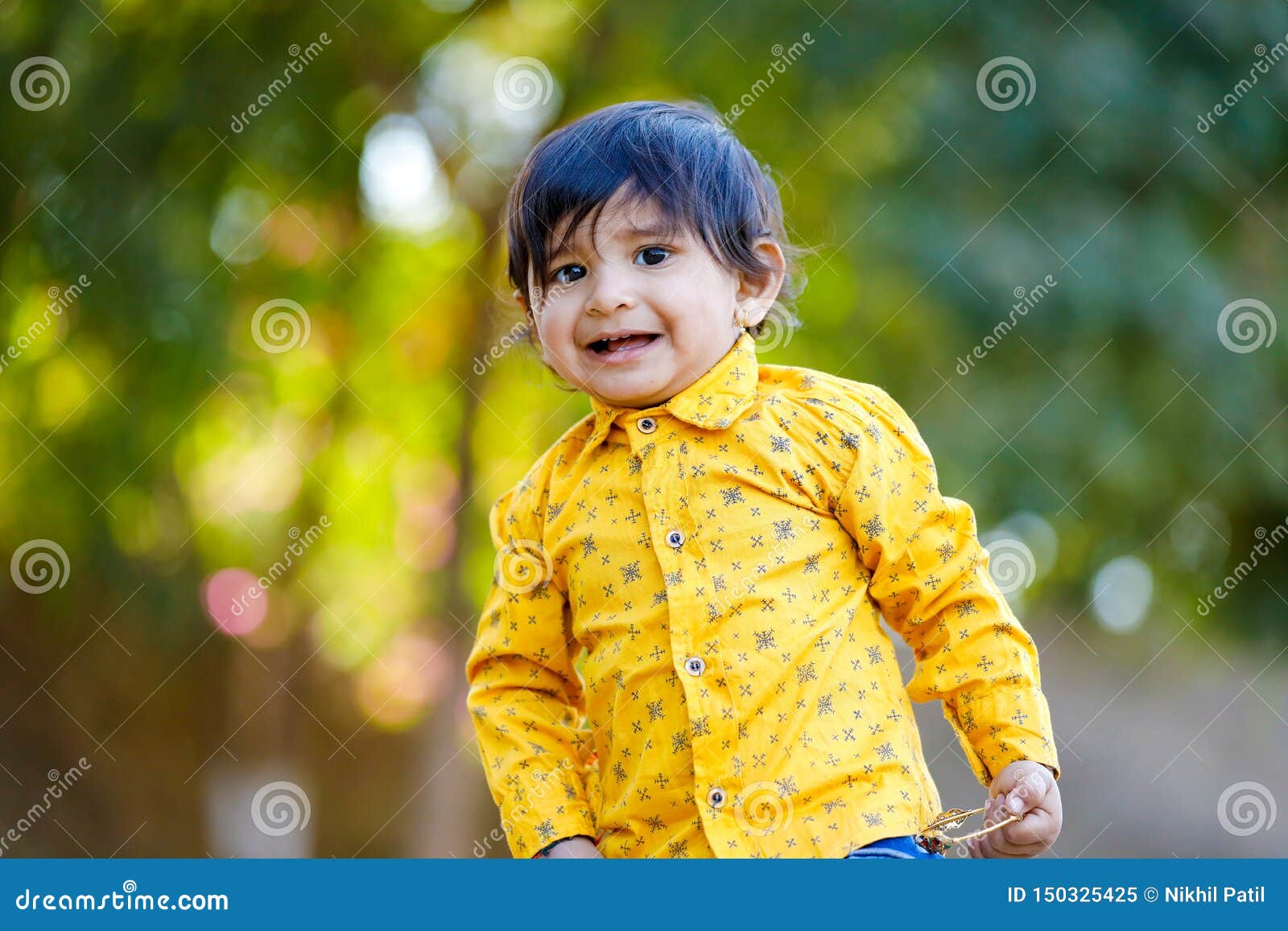 Cute Indian Baby boy stock image. Image of child, green - 150325425