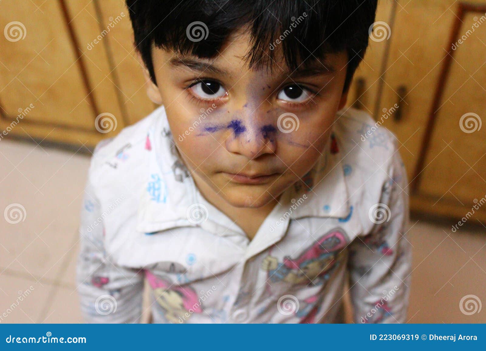 Blue Ink Marks on the Face of a Cute Indian Child Stock Image - Image ...
