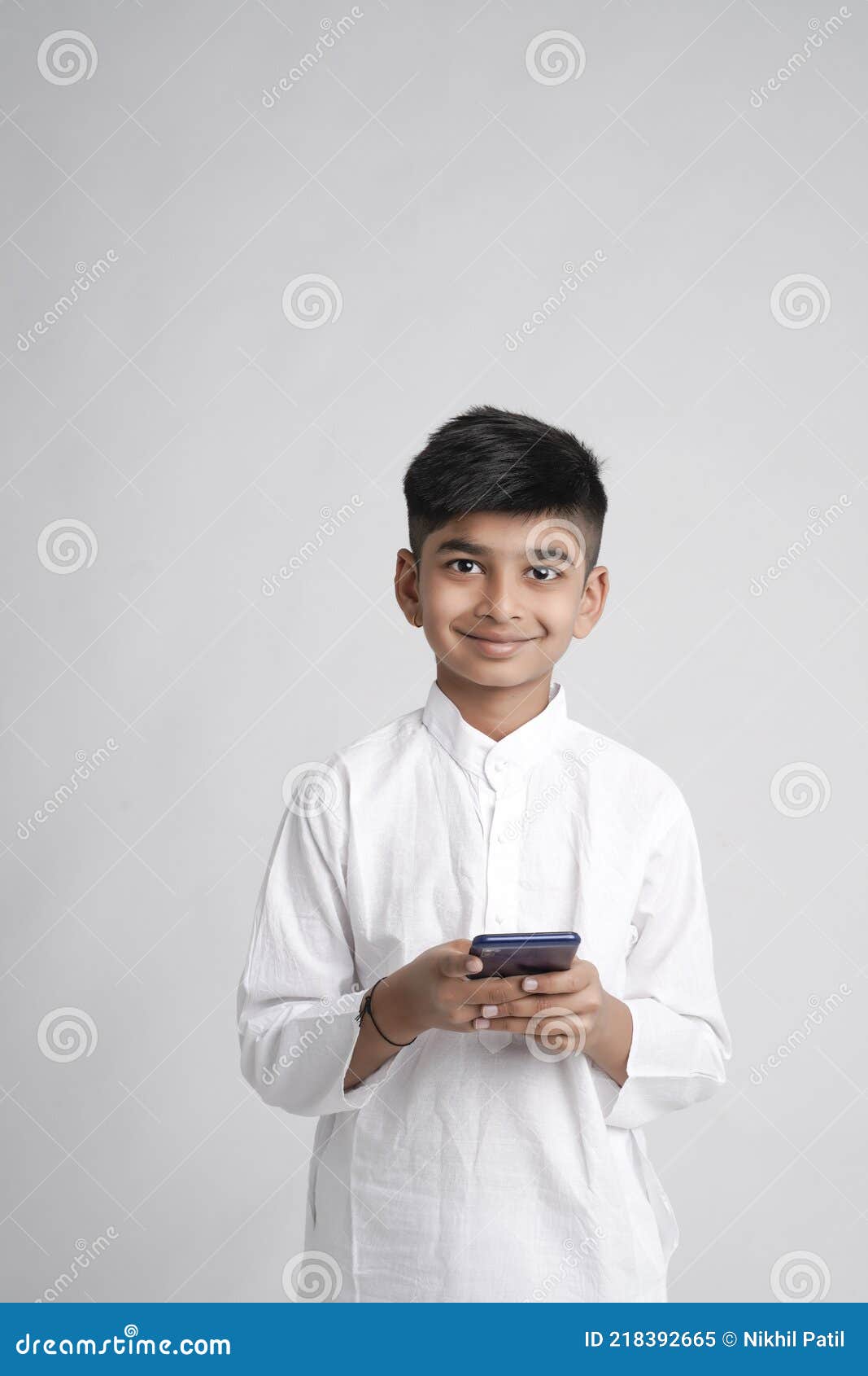 Cute Indian Little Boy Using Smart Phone Stock Image - Image of ...