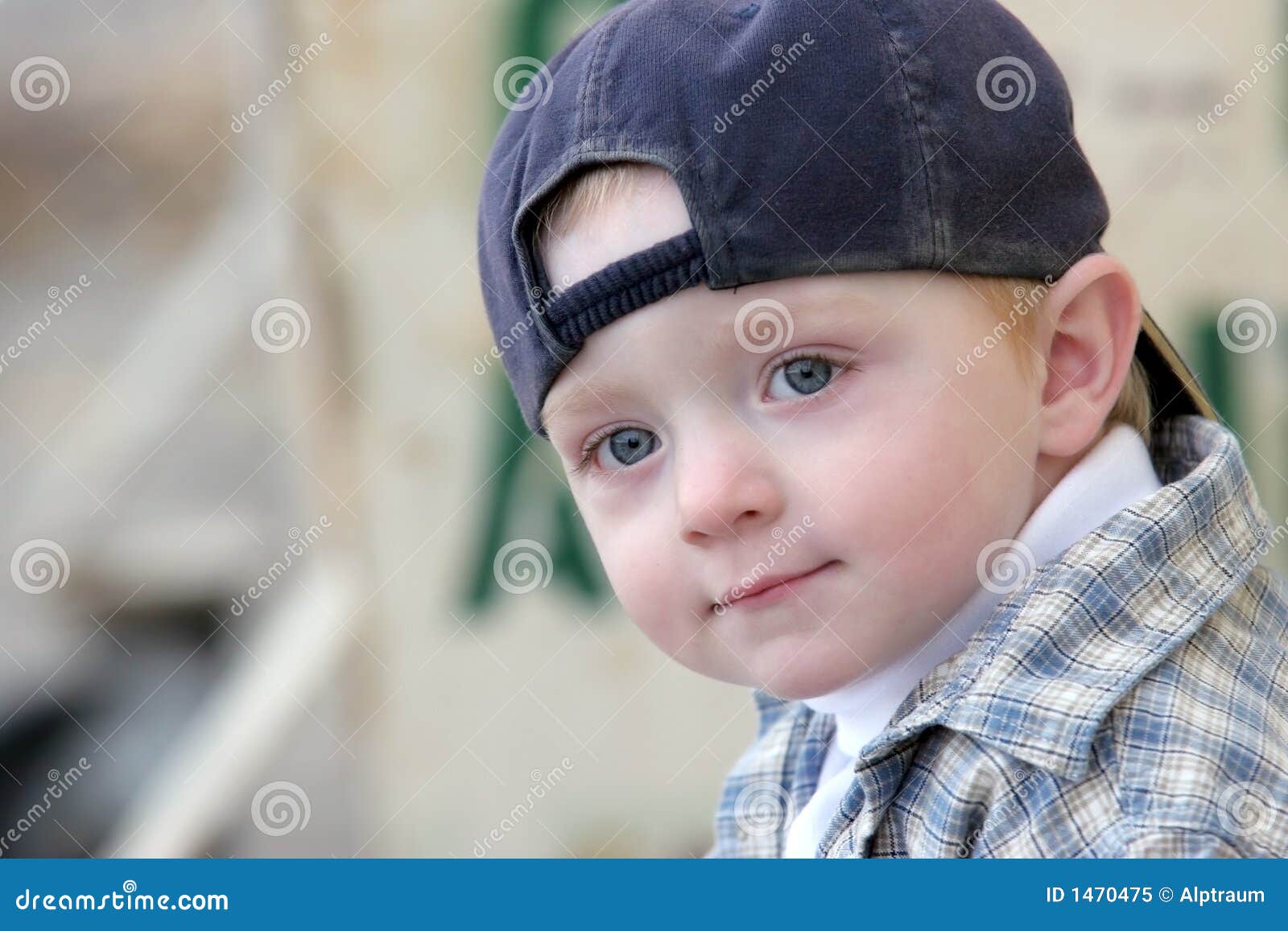 Cute kid with baseball cap stock image. Image of looking - 1470475