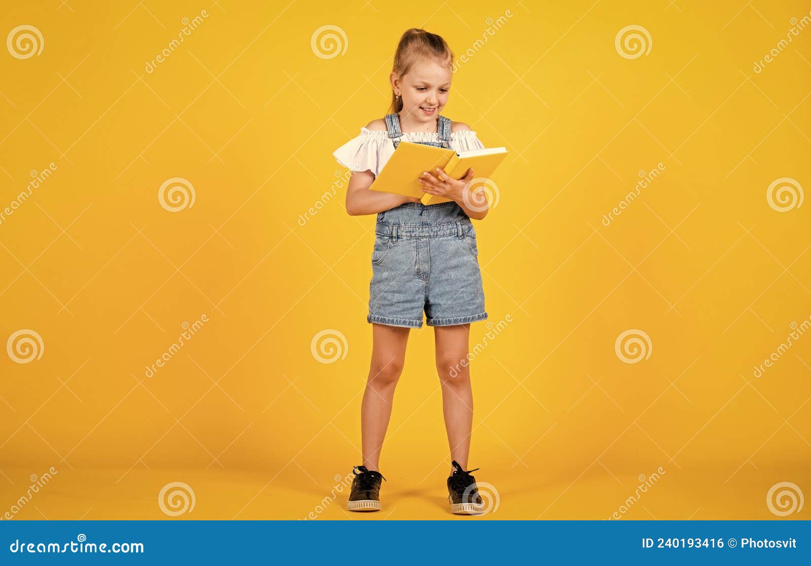 Cute Kid Going To Read Information from Book, Back To School Stock ...
