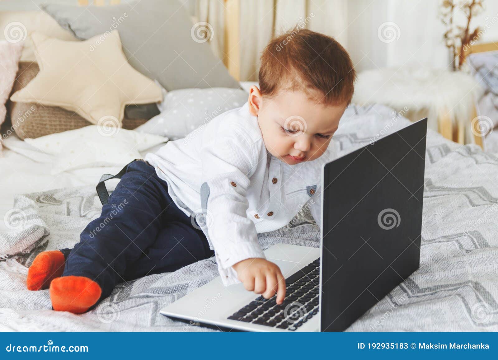 Boy sitting with laptop stock image. Image of people - 192935183