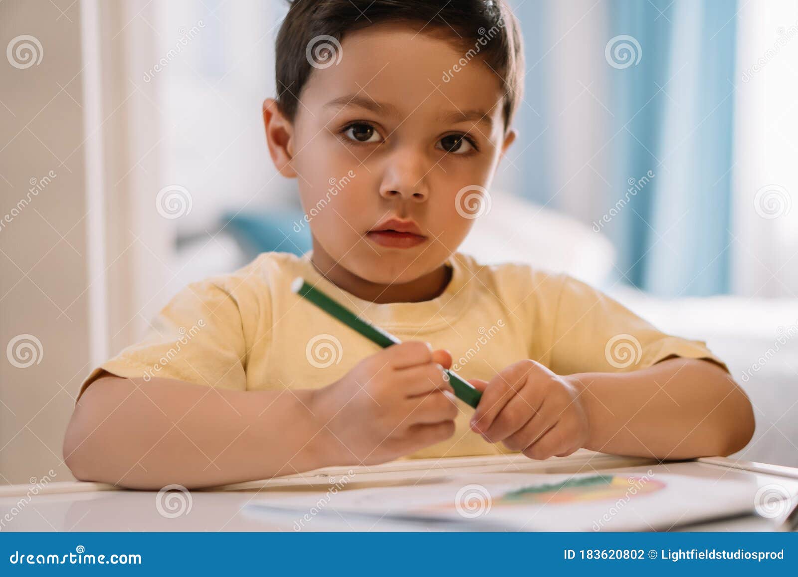 Cute Kid Looking at Camera while Stock Photo - Image of cute, european ...