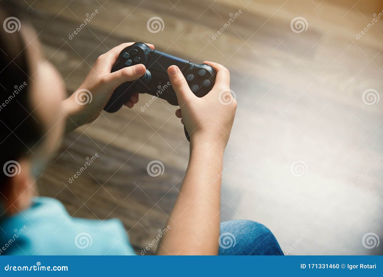 Boy playing video game stock photo. Image of teenager - 171331460