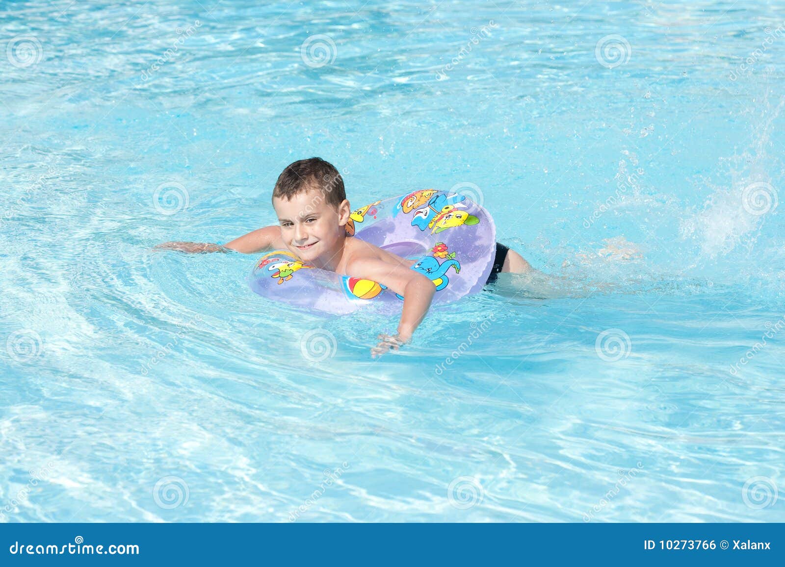 Cute kid swimming in pool stock photo. Image of secured - 10273766