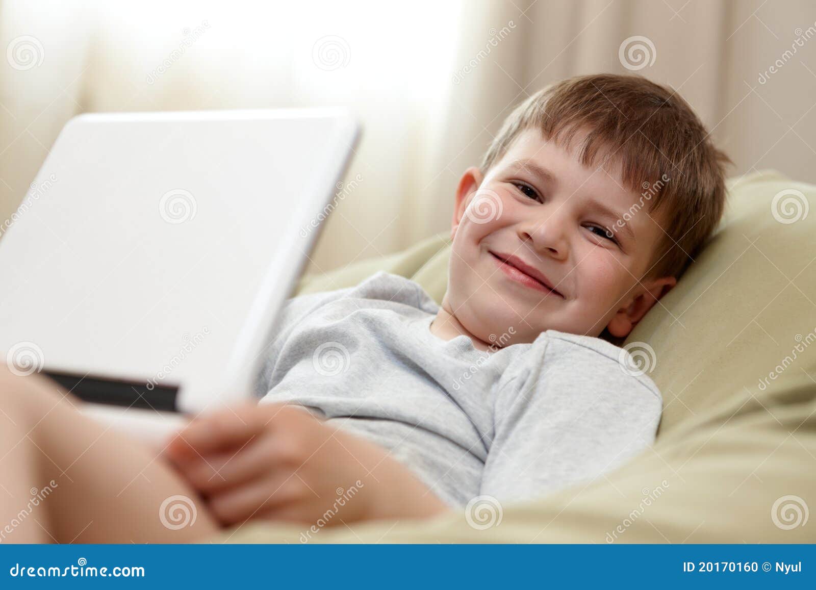 Cute Kid Using Laptop Computer Smiling Stock Photo - Image of casual ...