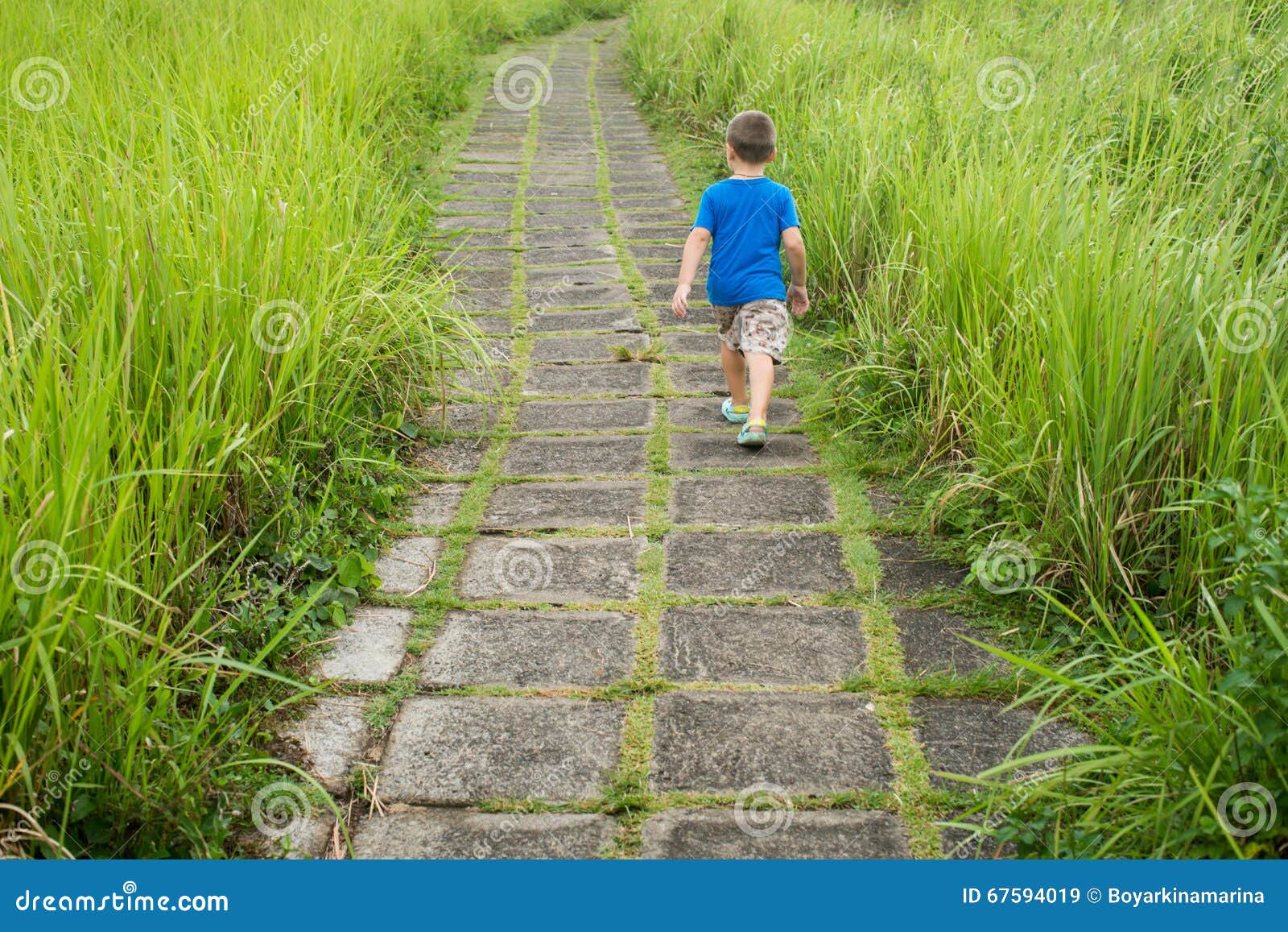 Cute Kid Walking Alone Outdoors. Stock Image - Image of road, outdoor ...