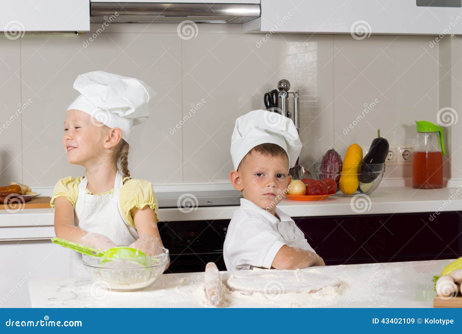 Cute Kids in Chefs Attire in Kitchen Stock Image - Image of enjoyment ...
