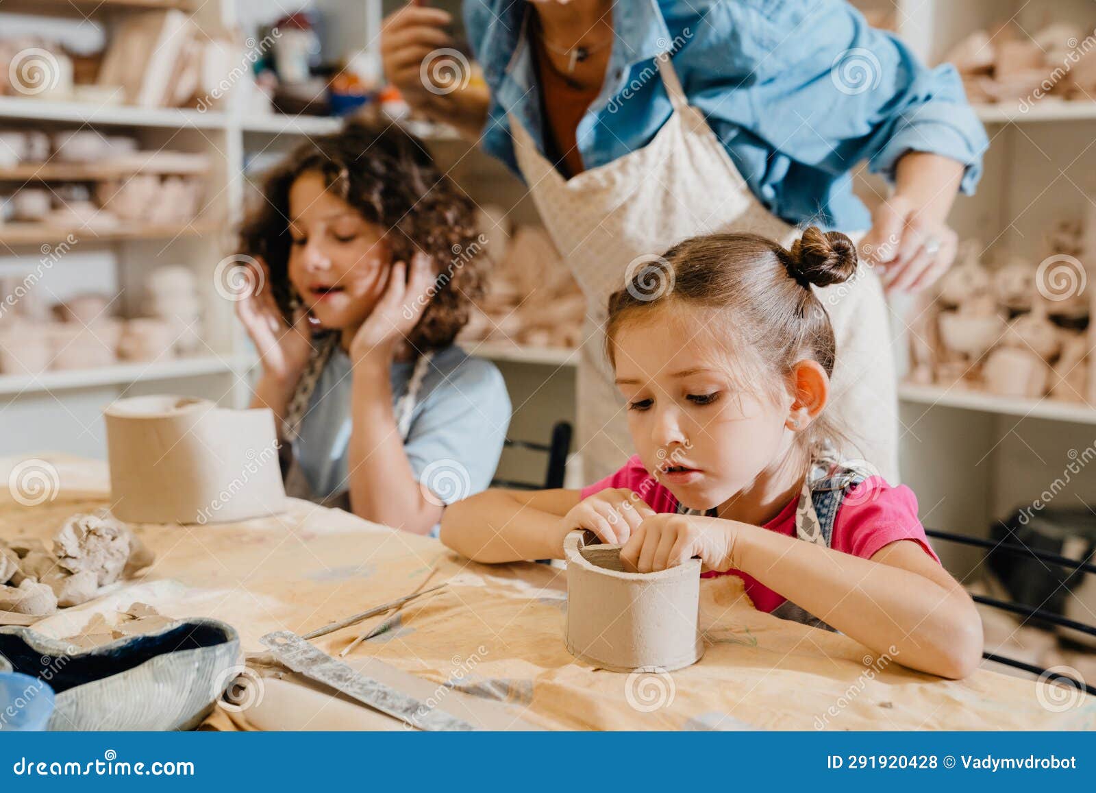 Cute Kids Sculpting Clay Crafts at Table in Pottery Class Stock Photo ...