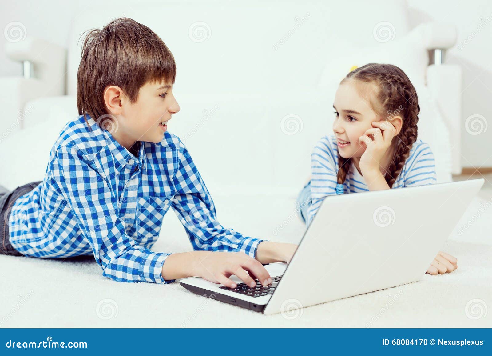 Cute kids using devices stock photo. Image of home, laptop - 68084170