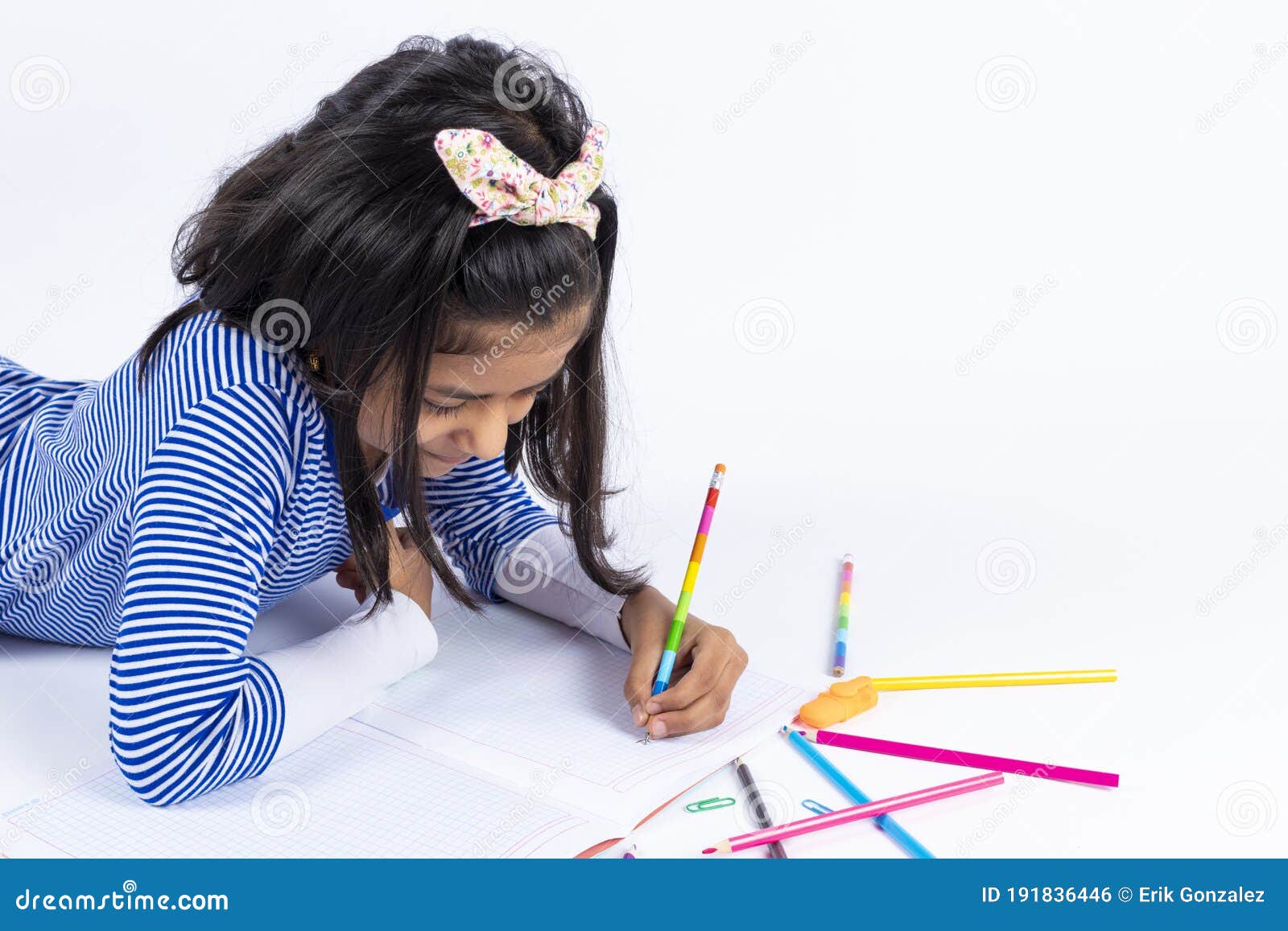 Cute Left-handed Girl is Writing with a Pencil Stock Photo - Image of ...